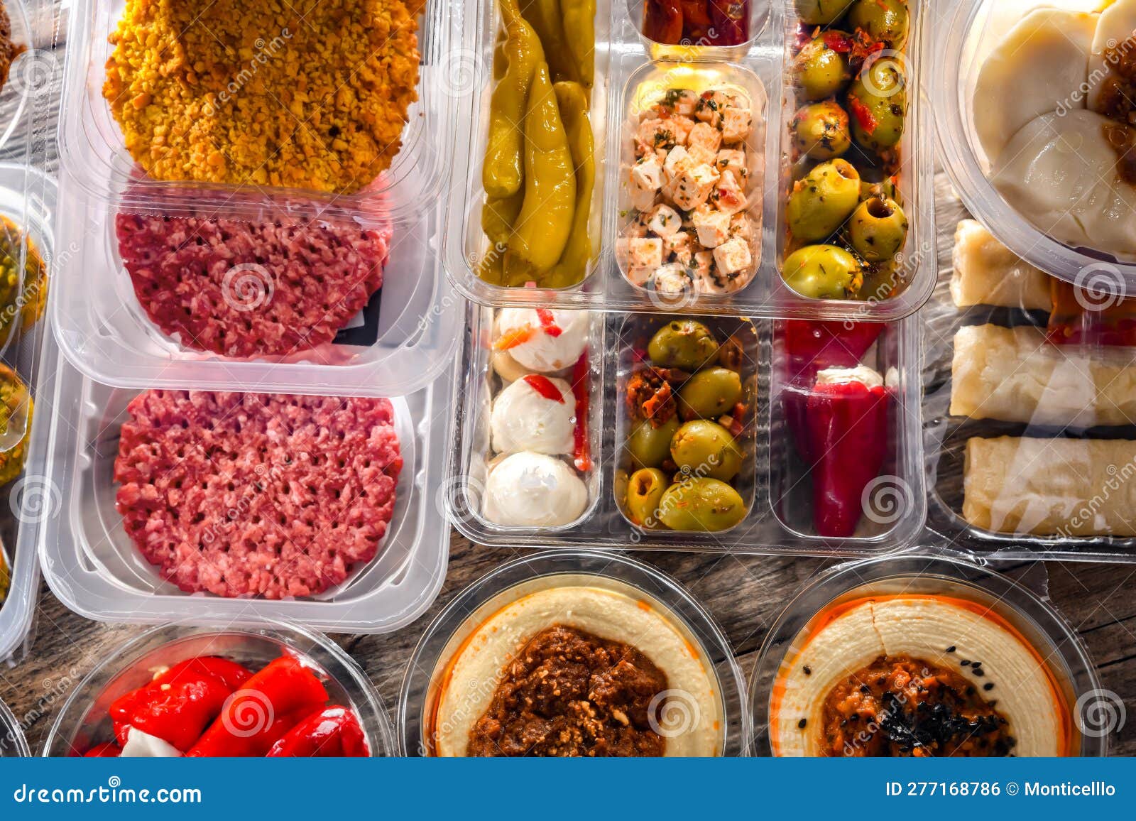 A Display of Prepackaged Food Products in Plastic Boxes Stock Photo ...