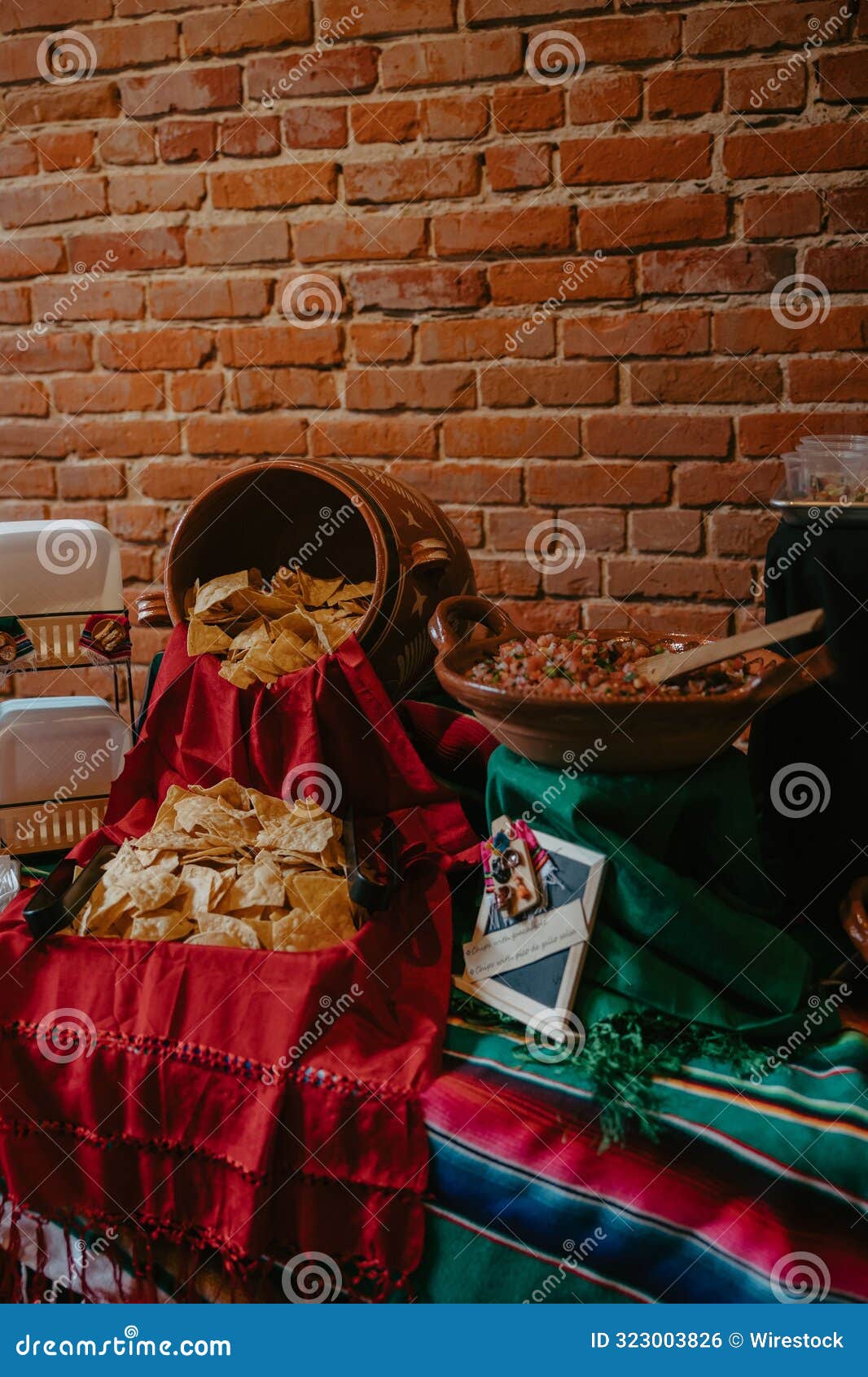 Display of Tortilla Chips and Salsa in Traditional Mexican Pottery with ...