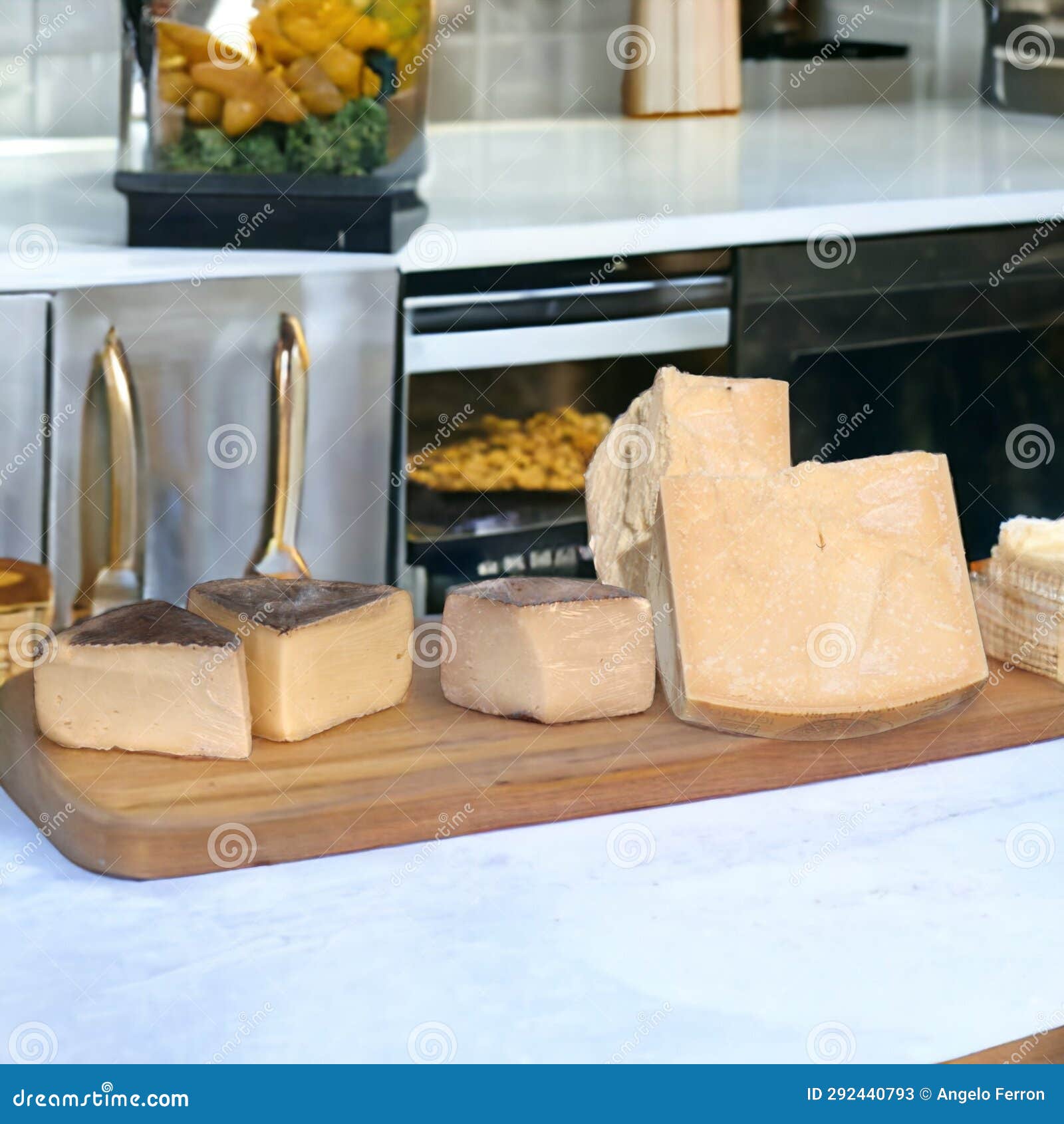 Display of Various Types of Cheese on the Kitchen Table- Stock Image ...