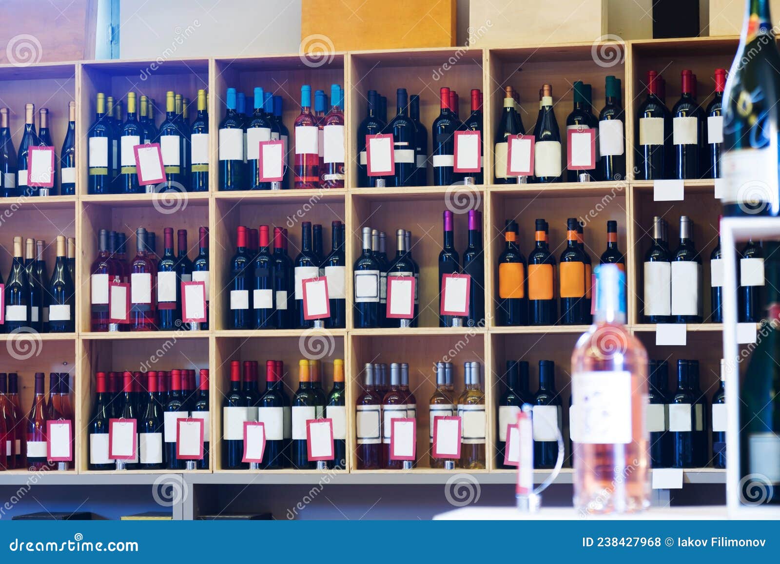 Display with Wine Bottles in Store Stock Photo - Image of display ...