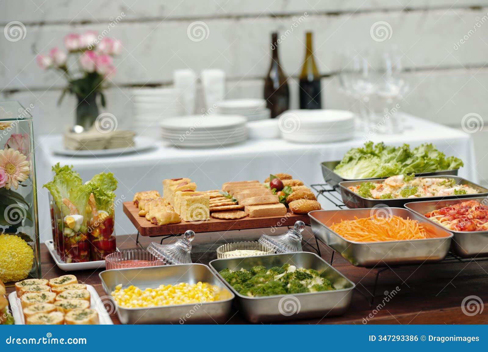 Displaying Assorted Buffet Table with Various Dishes Stock Photo ...