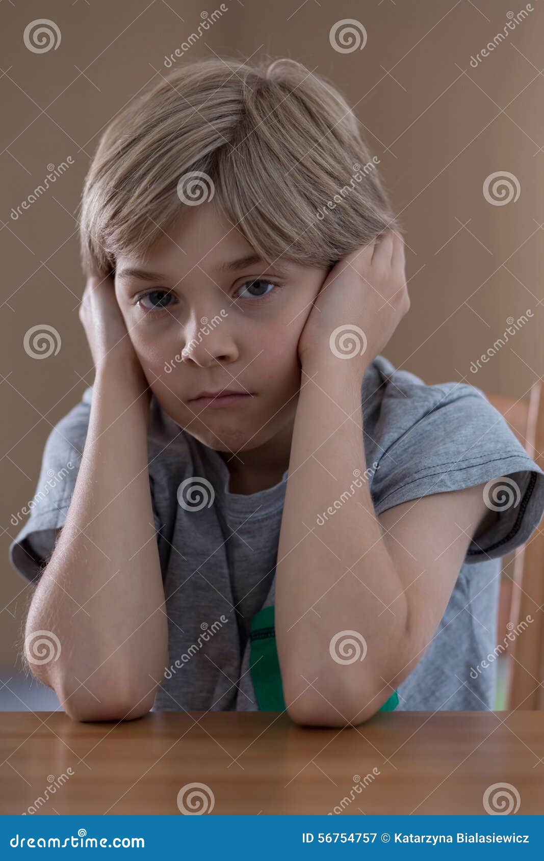 Displeased Boy Sitting at Table Stock Image - Image of face, problems ...