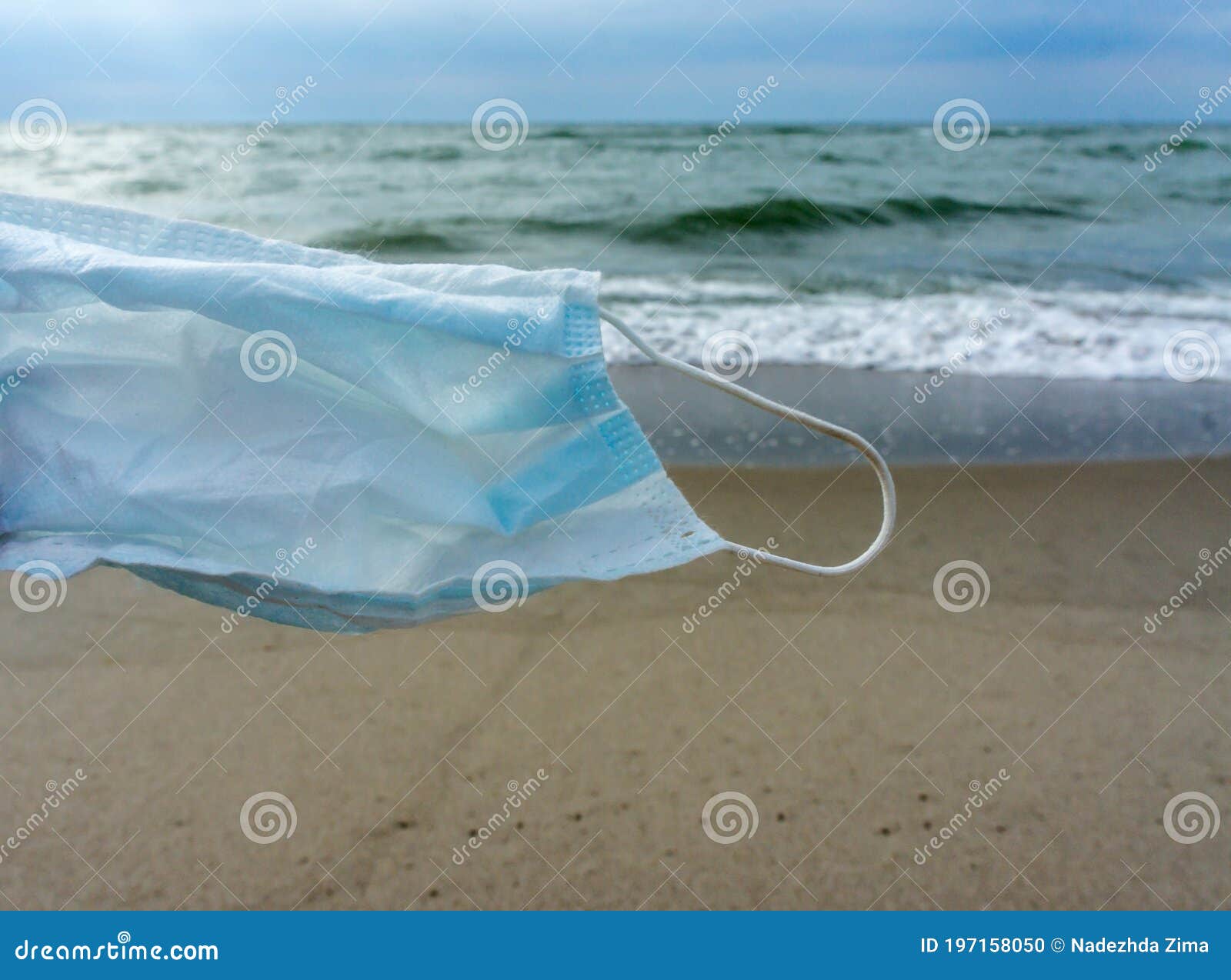 Medical Mask on the Seashore, Disposable Face Mask for the Coast Stock ...