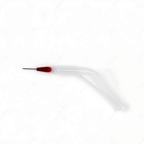 A Disposable Lancet Device for Blood Sampling, Lying Flat on a White ...