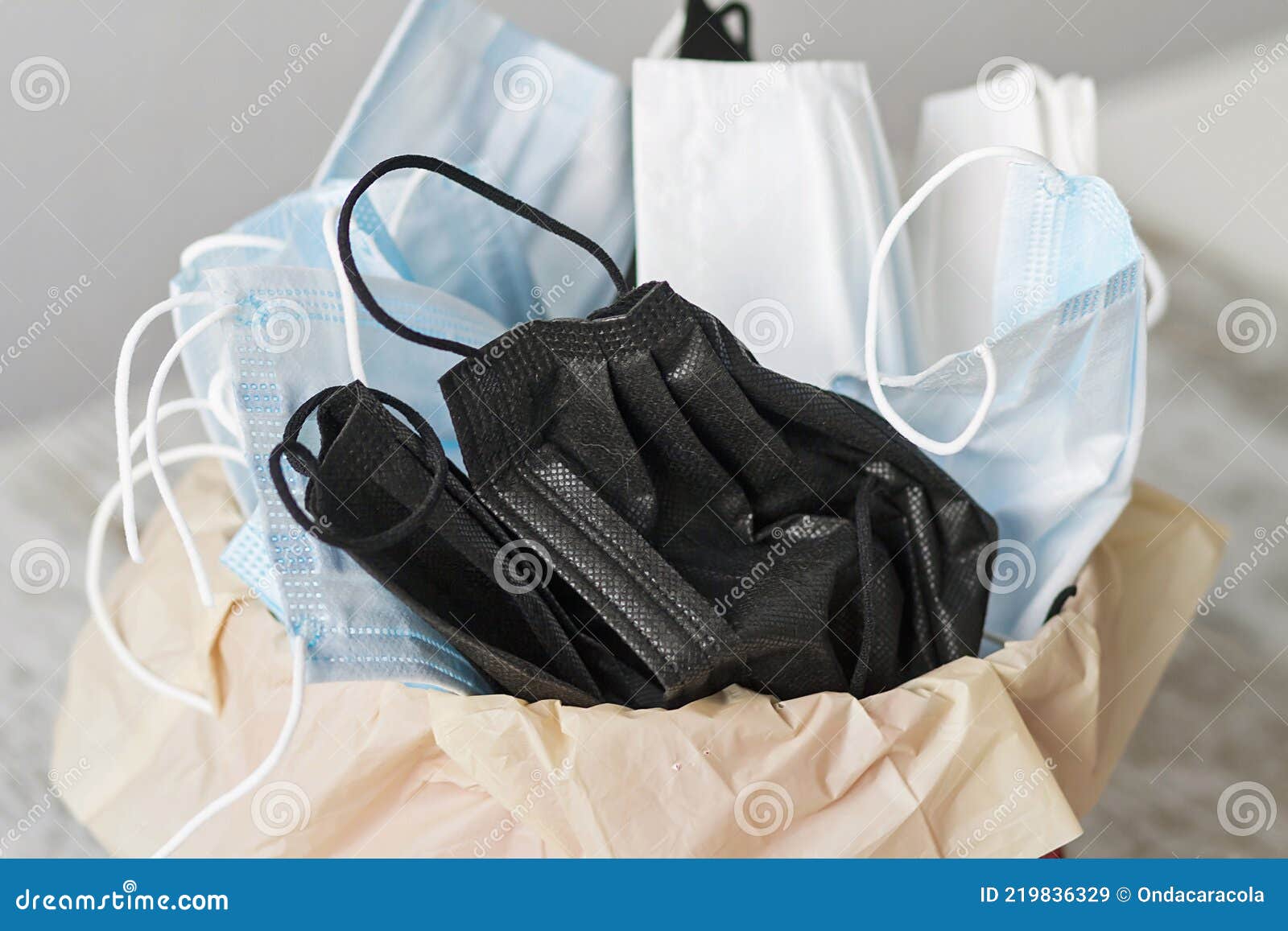 Disposable mask in the bin stock image. Image of medical - 219836329