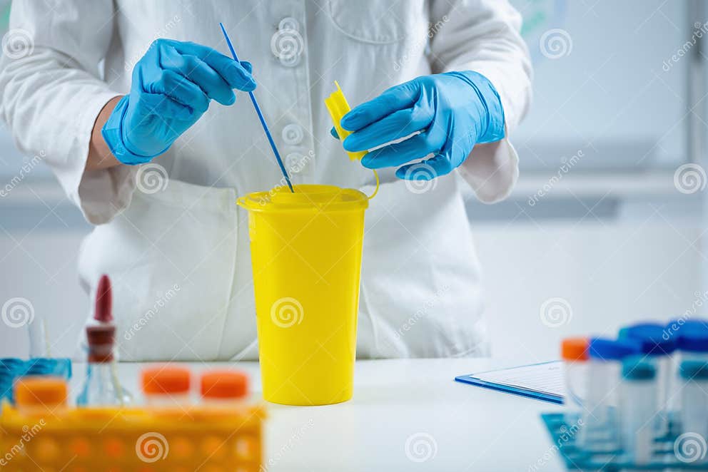 Disposing of Laboratory Consumables in Hazardous Waste Container Stock ...