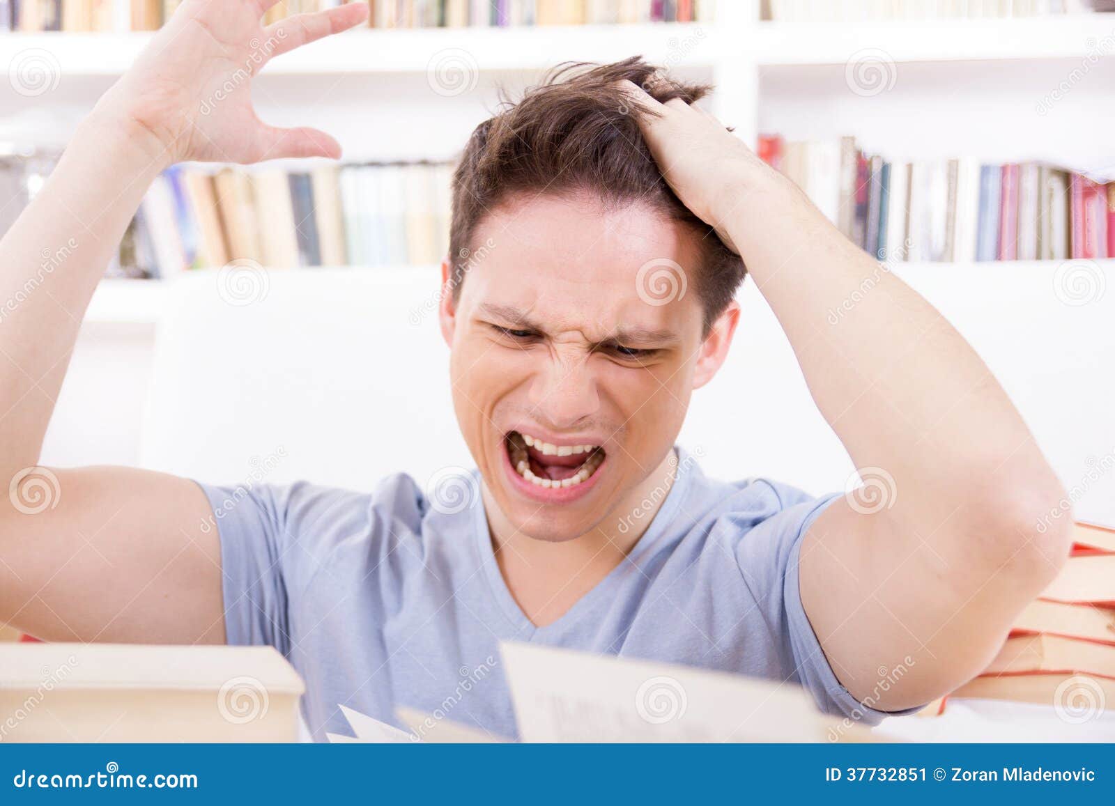 Dissatisfied and Upset Student with Hand on His Head Stock Image ...