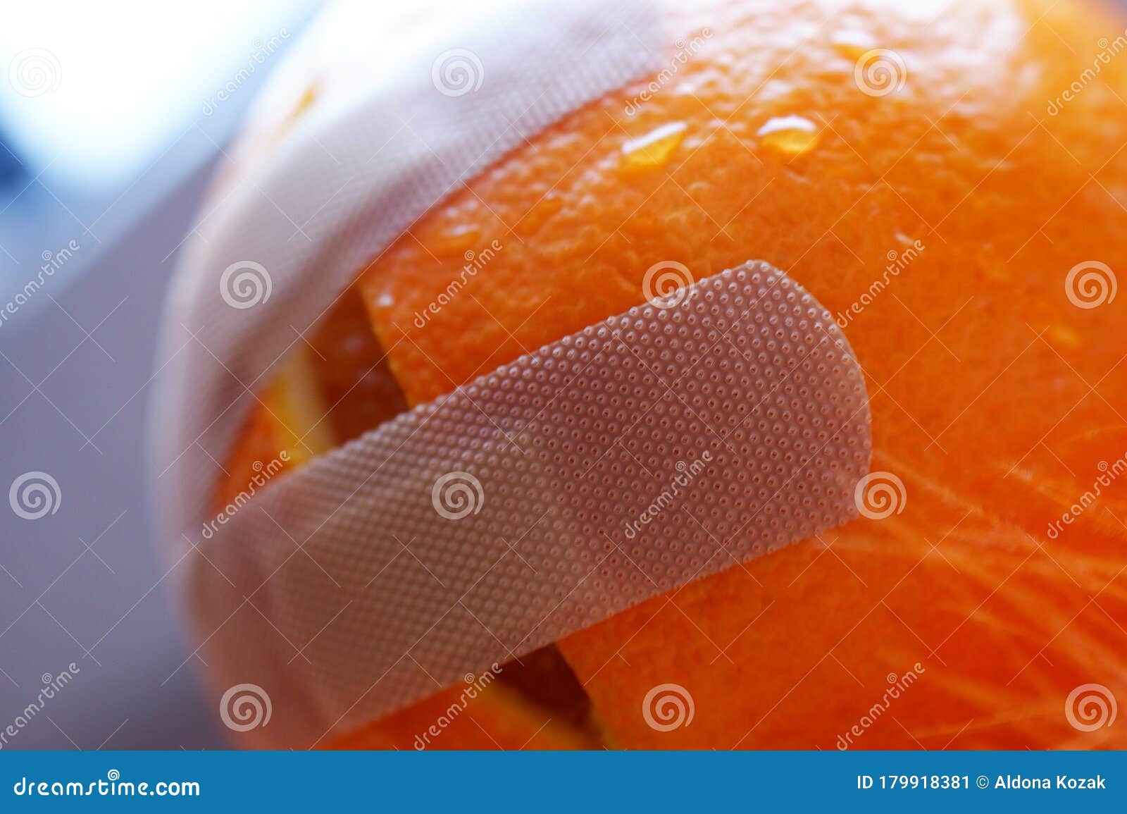 Dissected Damaged Cut Orange Stuck with a Plaster and Dressing Stock ...