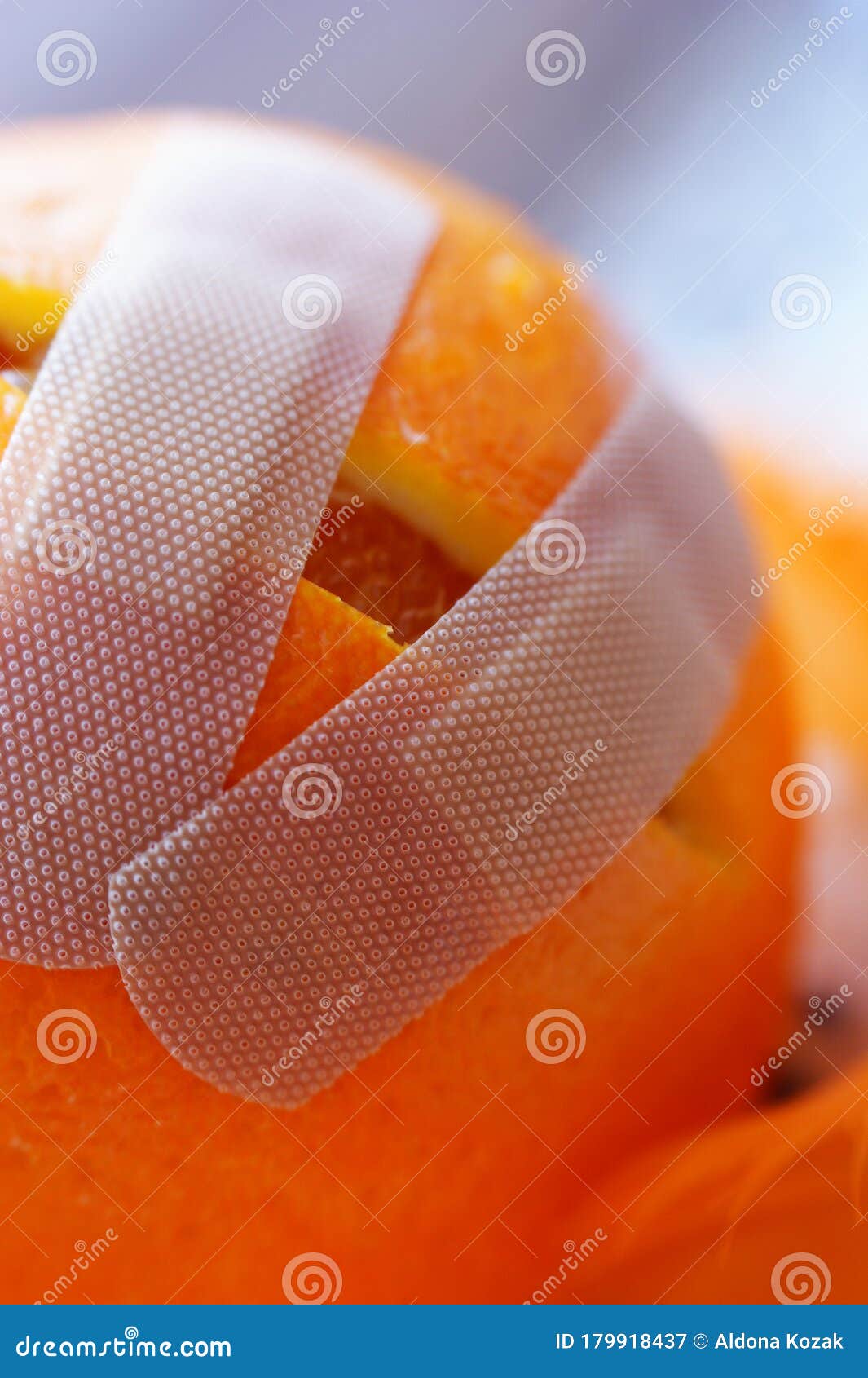 Dissected Damaged Cut Orange Stuck with a Plaster and Dressing Stock ...