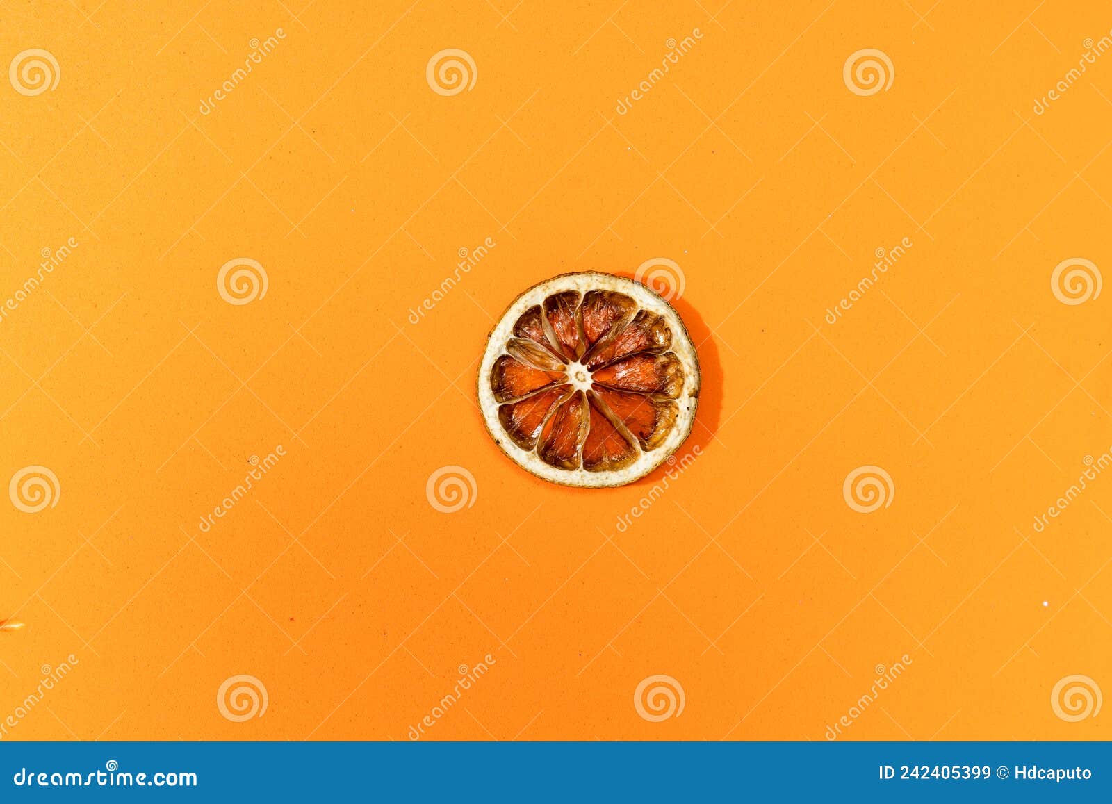 Dissected Orange Slice on a Orange Surface Stock Image - Image of ...