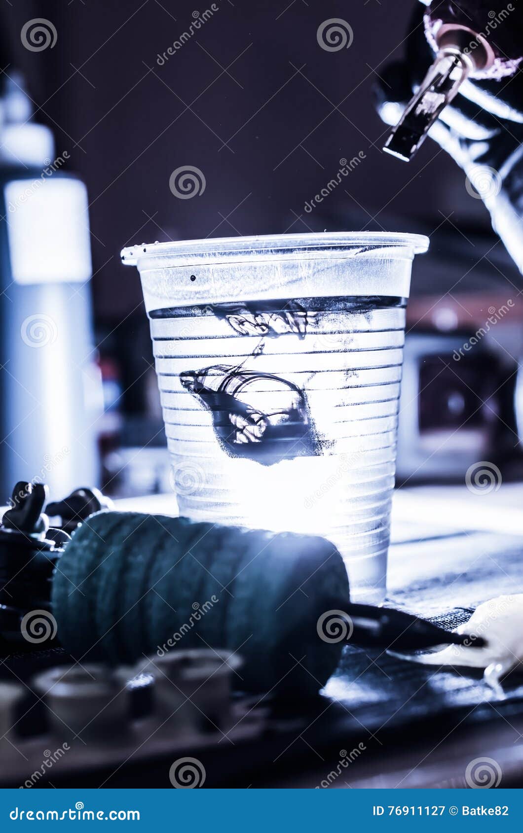 Dissolving Tattoo Ink in Glass of Water Stock Image - Image of designer ...