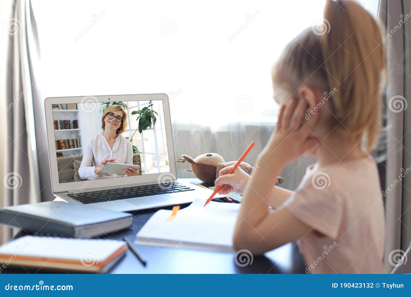 Distance Learning. Cheerful Little Girl Using Laptop Computer Studying ...