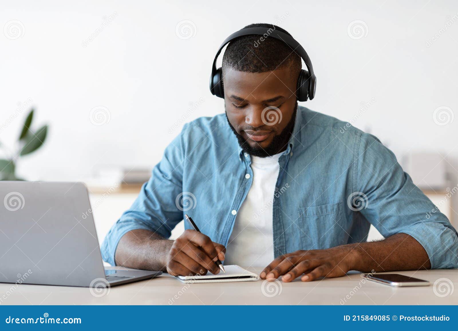 Distance Learning. Young Black Guy in Headphones Study with Laptop at ...