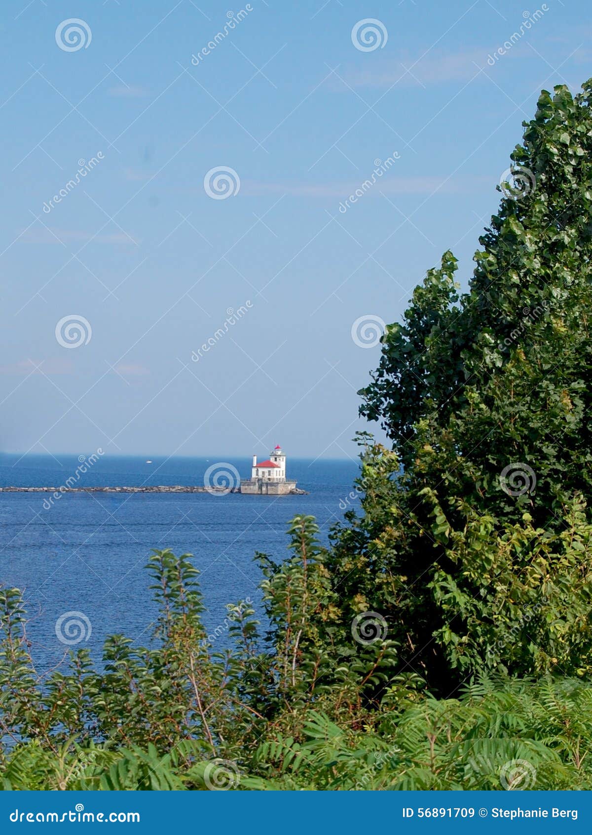 Distant Lighthouse stock image. Image of port, lighthouse - 56891709