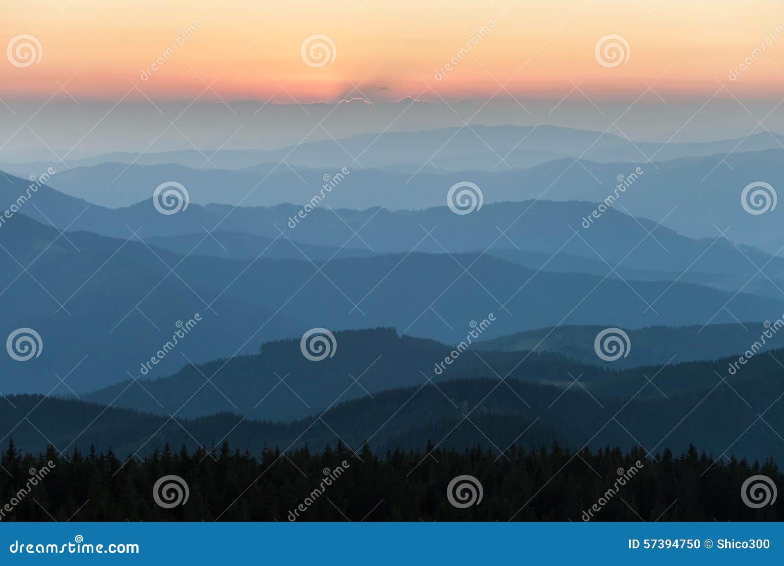 Distant Mountain Range and Thin Layer of Clouds on the Valleys Stock ...