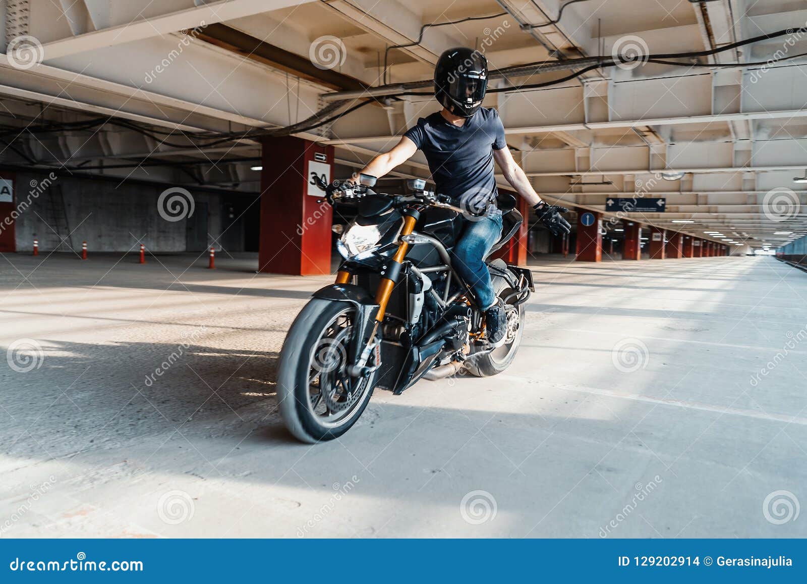 Distant Plan Of Biker Riding Motorcycle At Parking. Urban Background ...