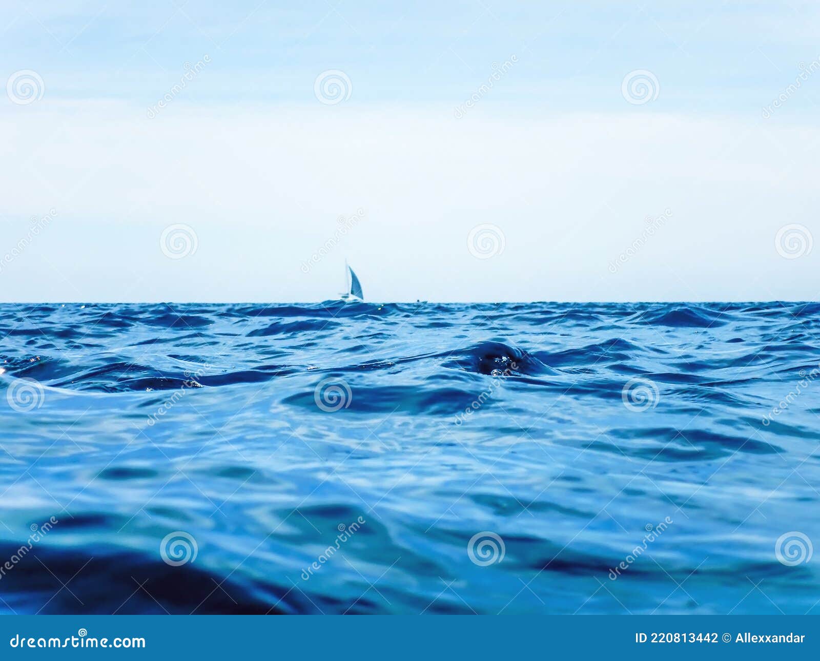 Distant Sailboat on the Sea Stock Photo - Image of distant, ocean ...