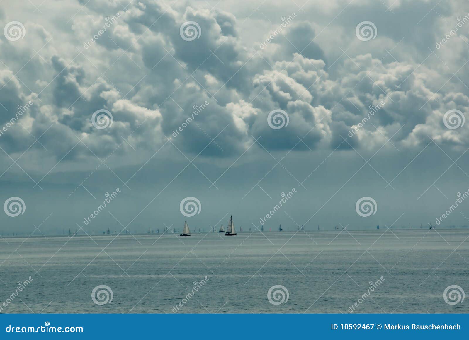 Distant sailboats on lake stock image. Image of lake - 10592467