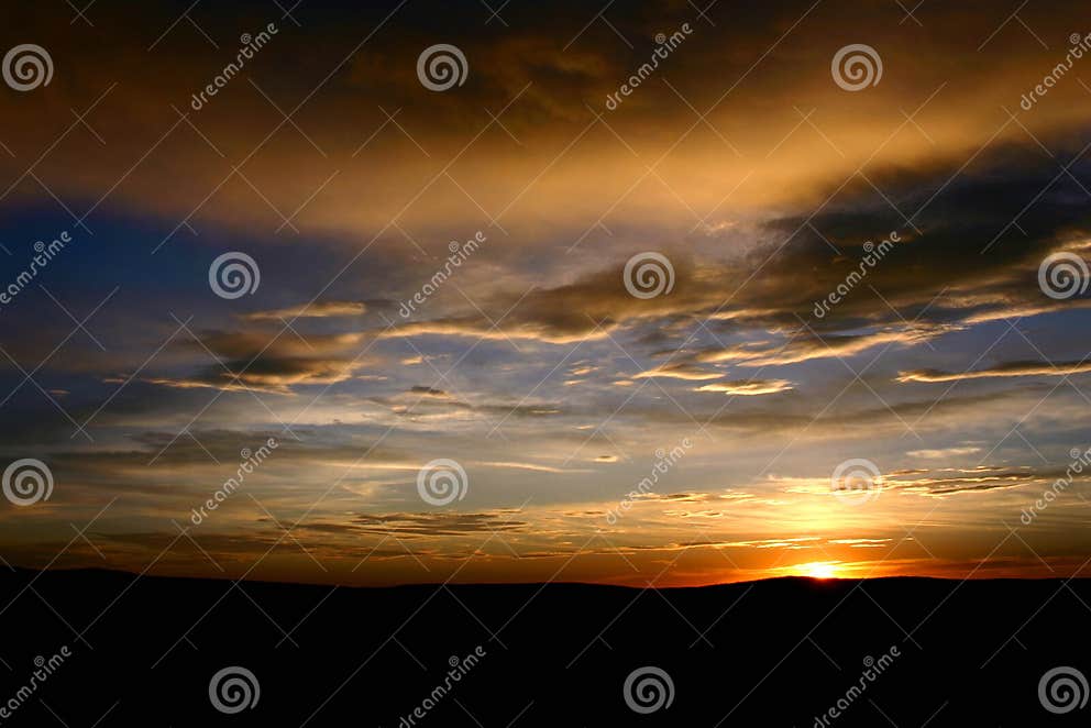 Distant Sun stock photo. Image of orange, clouds, sunset - 301804