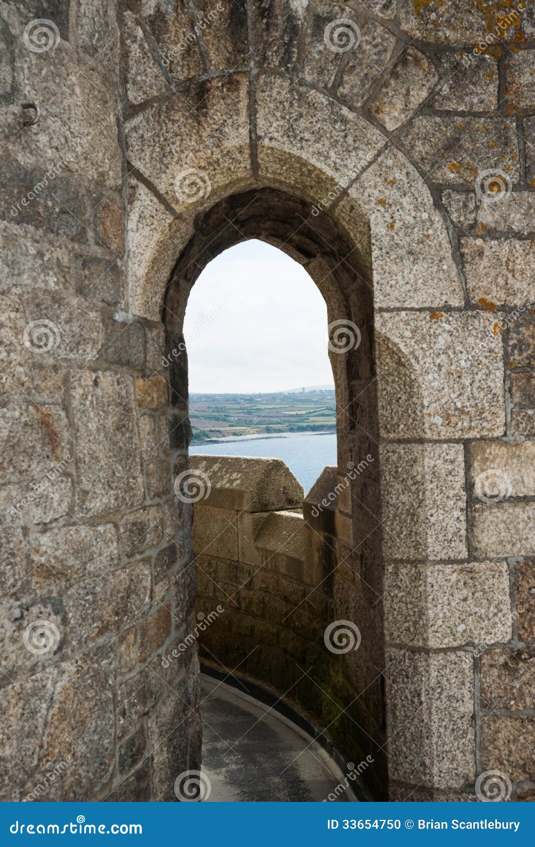 Distant view through arch stock photo. Image of arch - 33654750