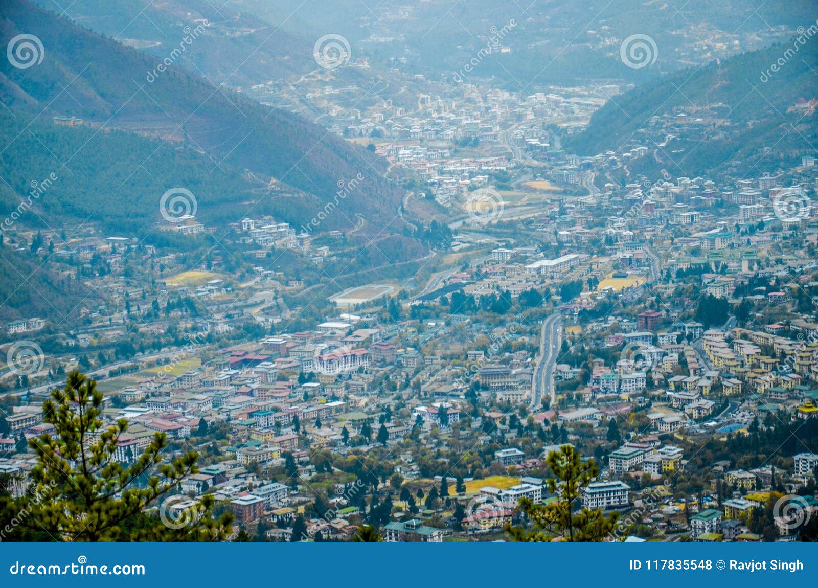 A Distant View of Closely Compacted Houses with Mountains and Paths in ...