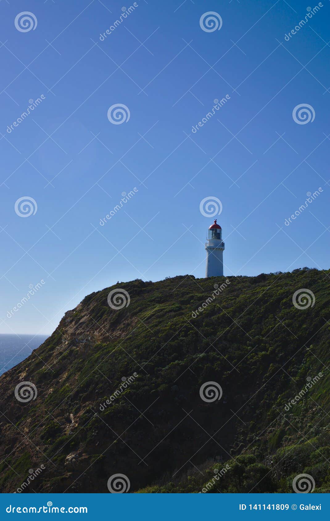 Distant view of lighthouse stock image. Image of exterior - 141141809