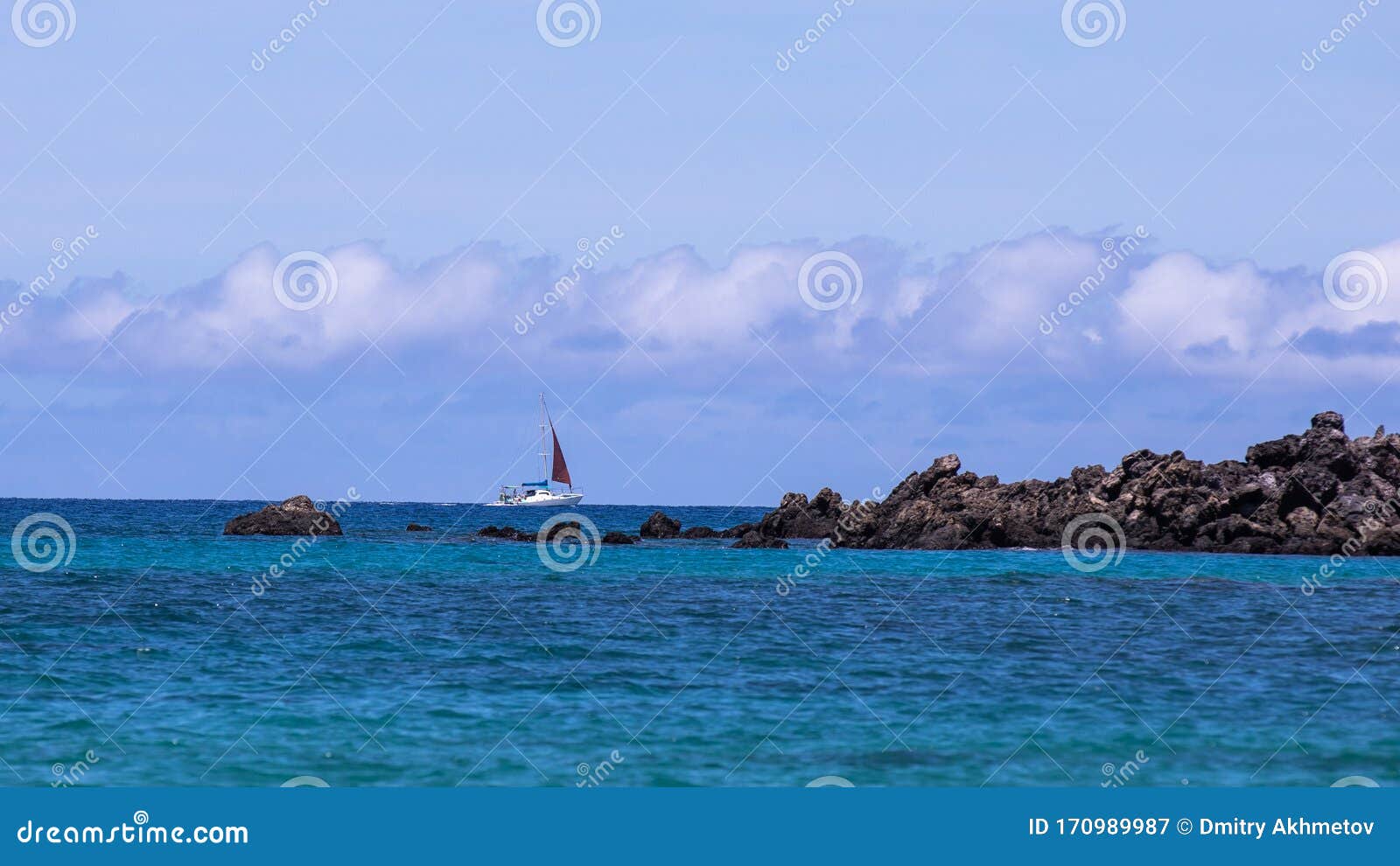 Distant View on a Sailboat with Beautiful Clouds in Background Stock ...