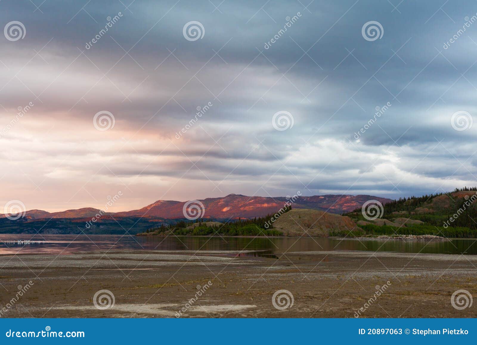 Distant Yukon Mountains Glowing in Sunset Light Stock Image - Image of ...