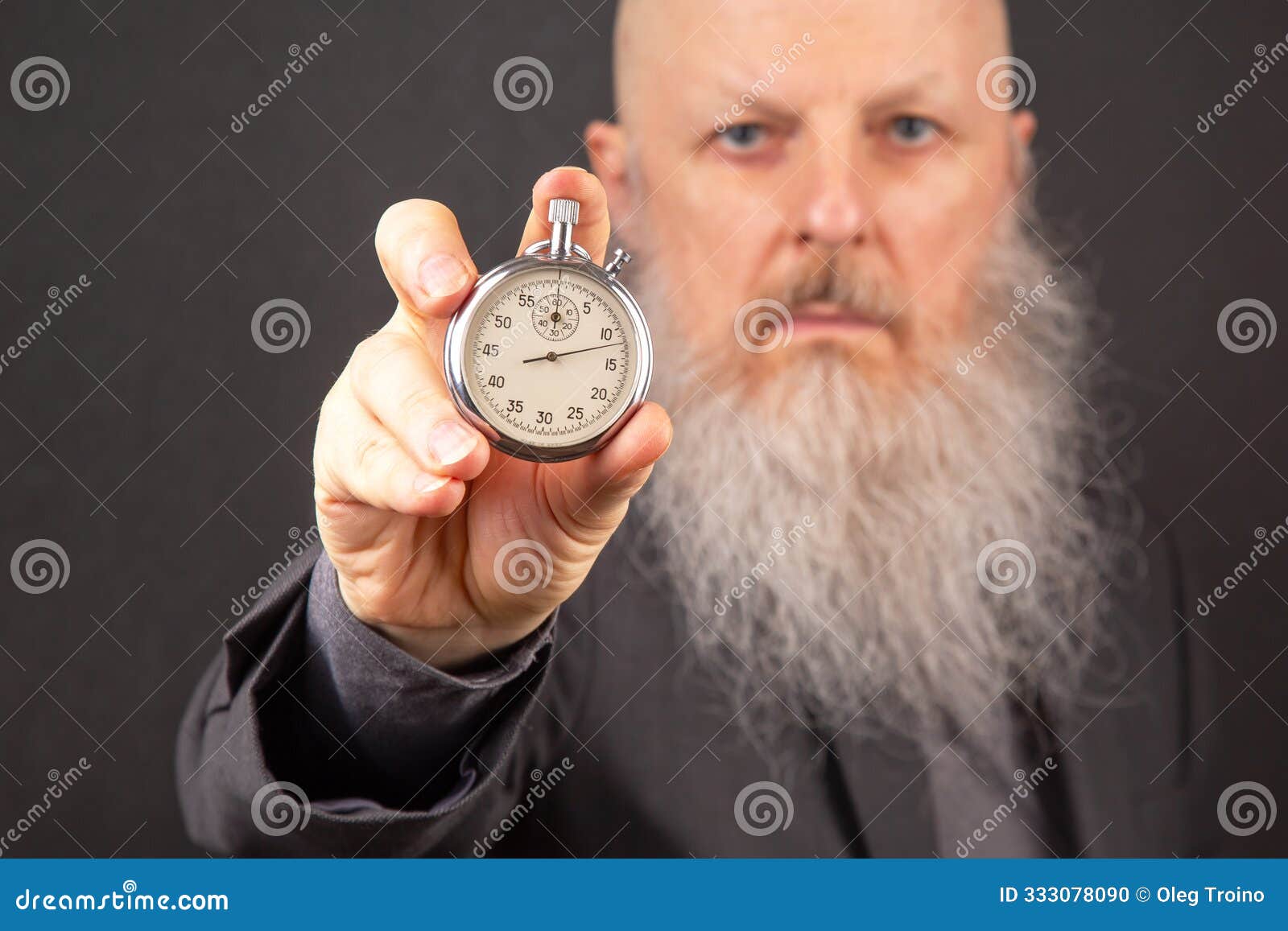 Distinguished Man with a Sizable Gray Beard Displaying the Time on a ...