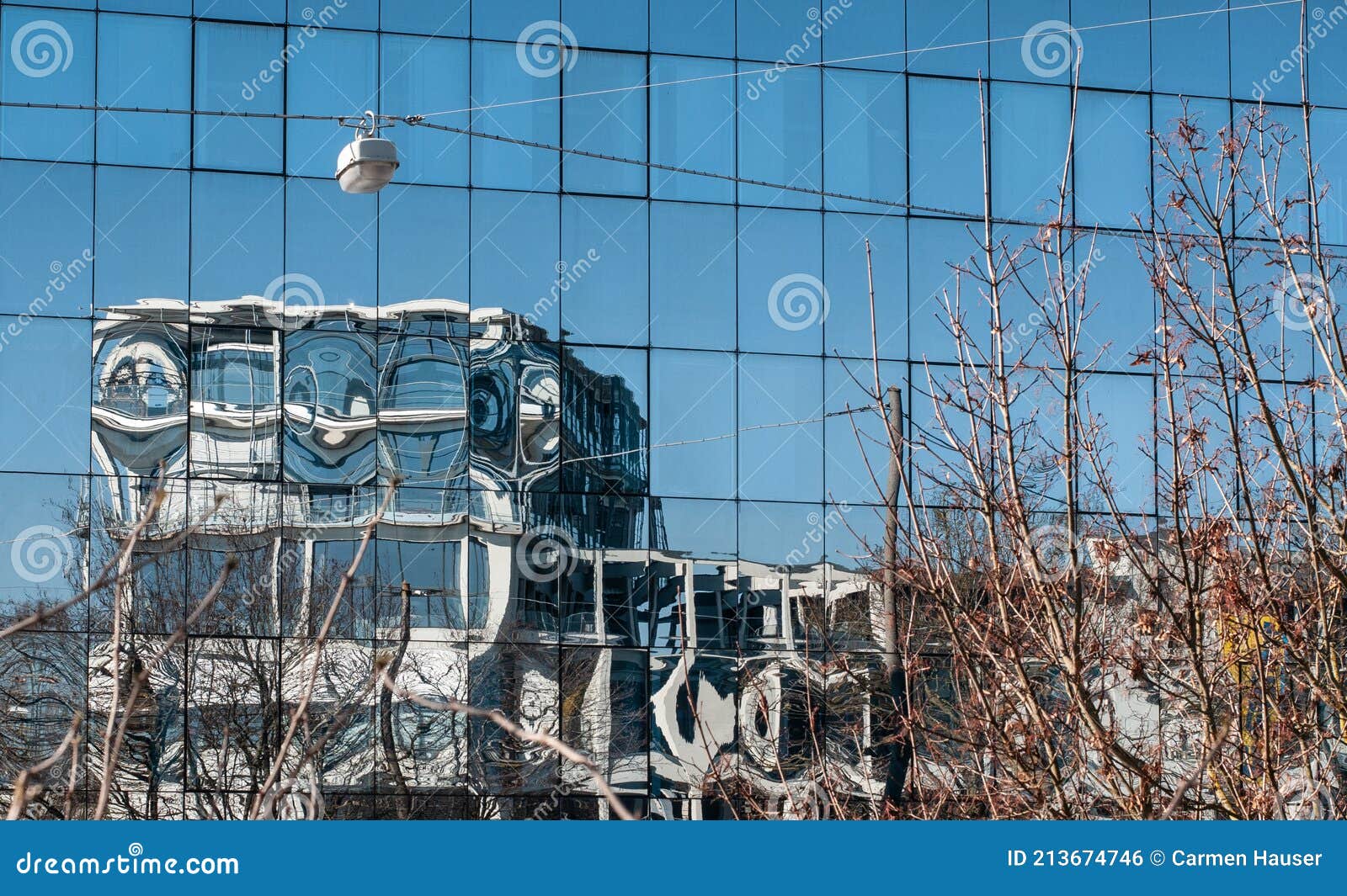 The Distorted Reflection of a Building in a Glass Facade Stock Photo ...