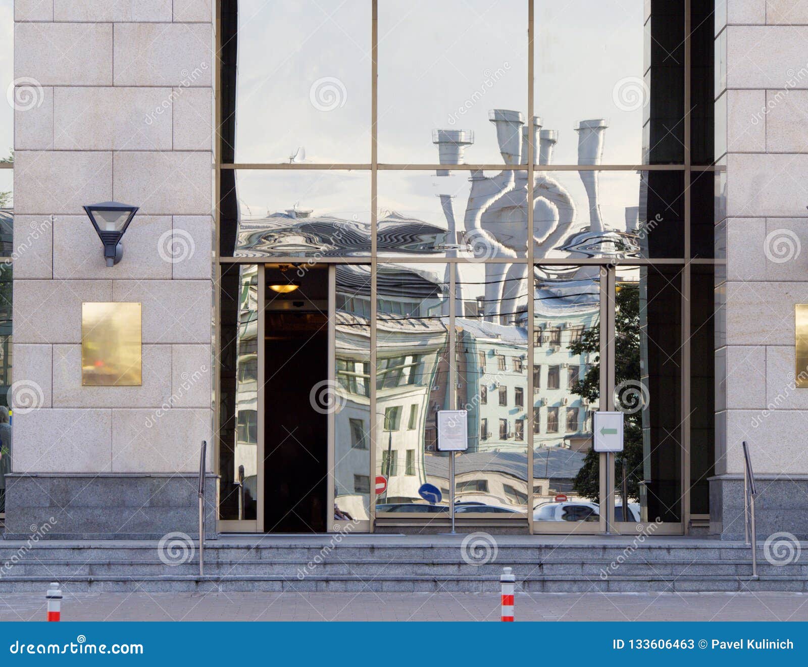 Distorted Reflection of Buildings in the Mirror Showcase of the Stock ...