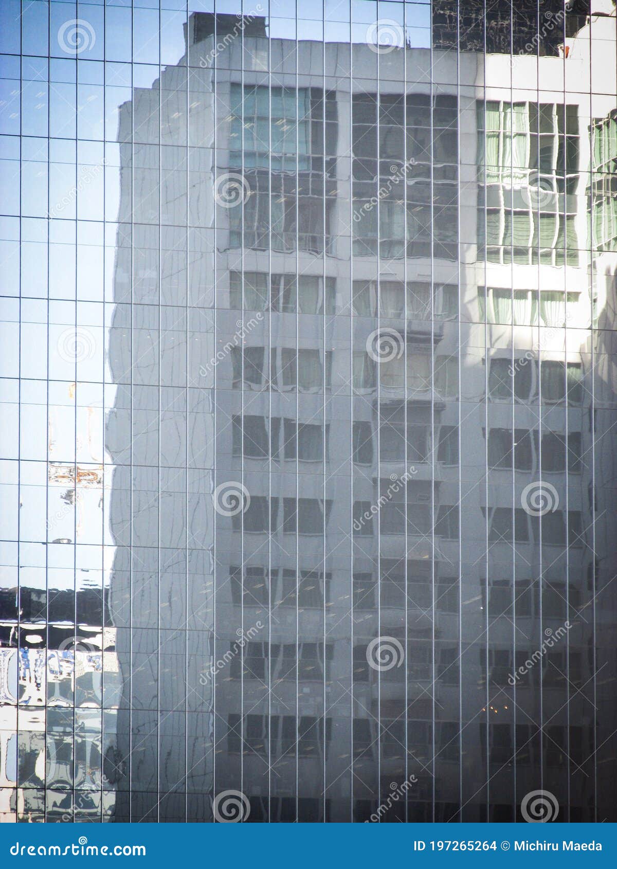Distorted Reflection of a High-rise Building on Glass Windows Stock ...