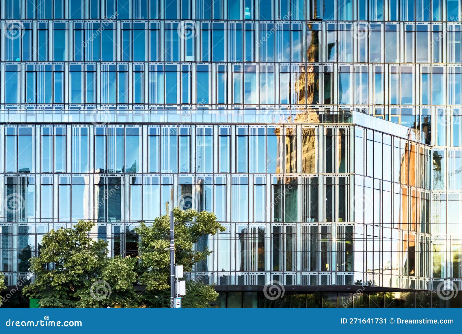 Distorted Reflections of Skyscrapers in the Glass Facade of a Modern ...