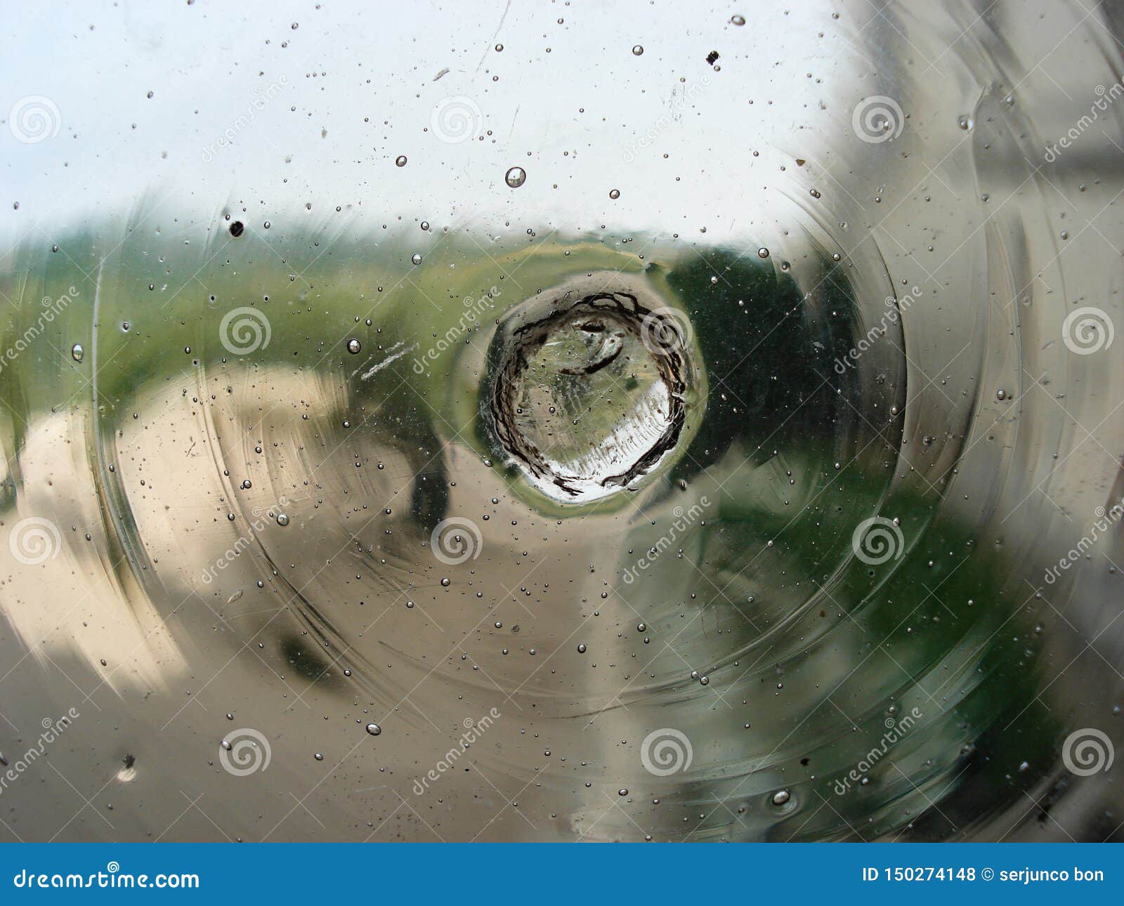 Distorted View through a Glass of an Image of Exterior, Garden and ...