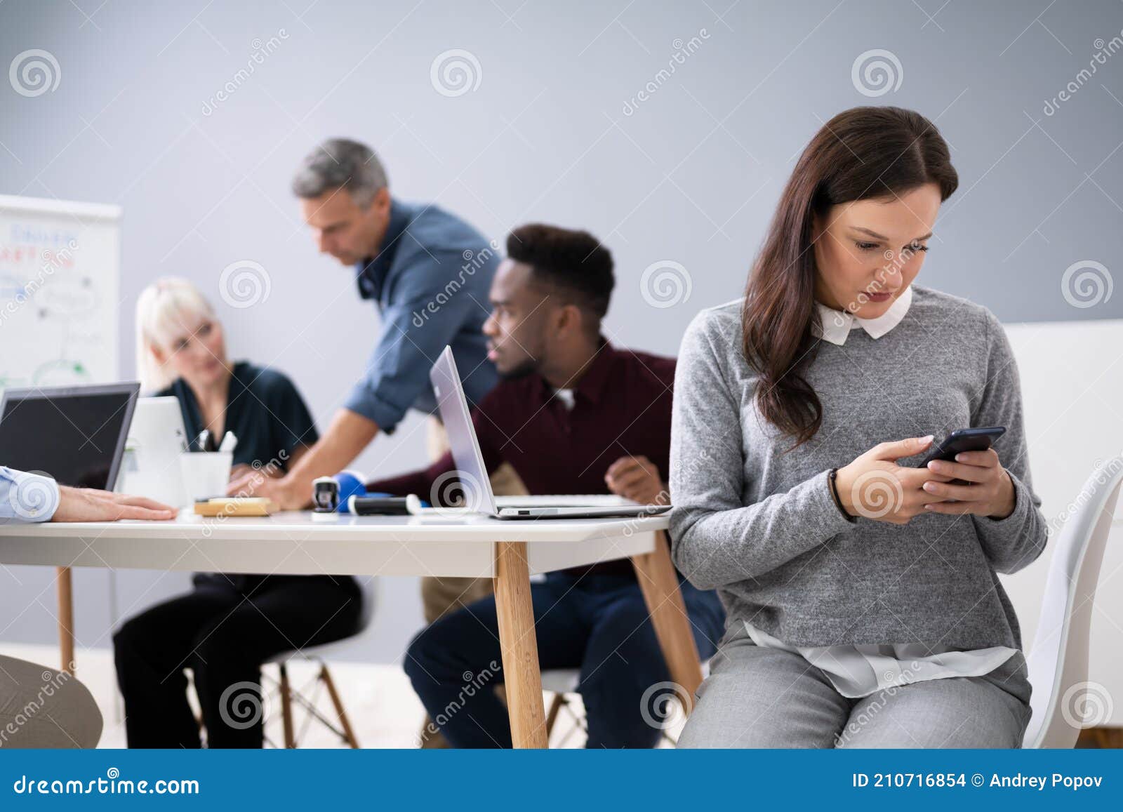Distracted Businesswoman in Meeting Stock Photo - Image of latin ...