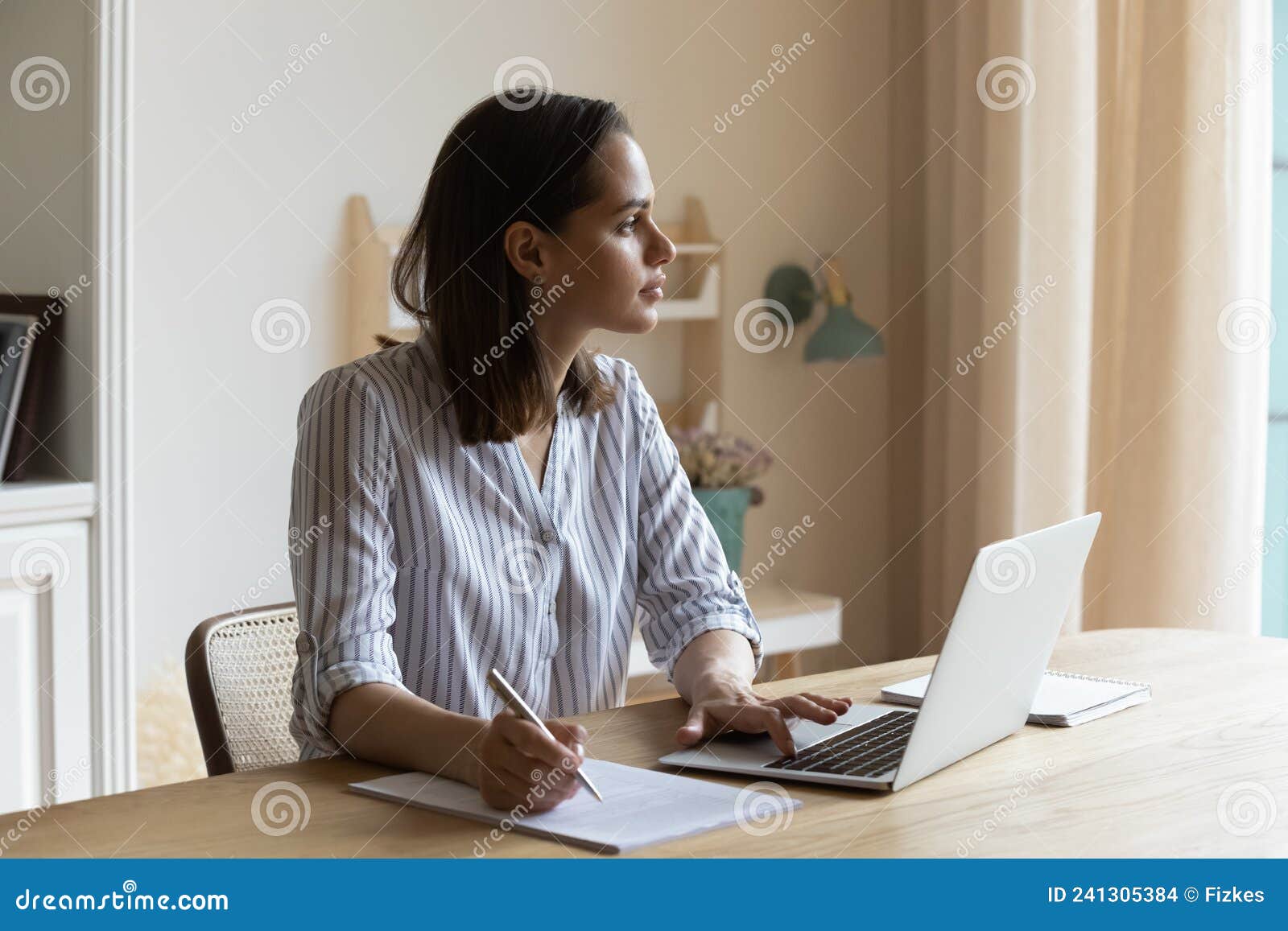 Distracted from Computer Work Pensive Young Businesswoman Looking in ...
