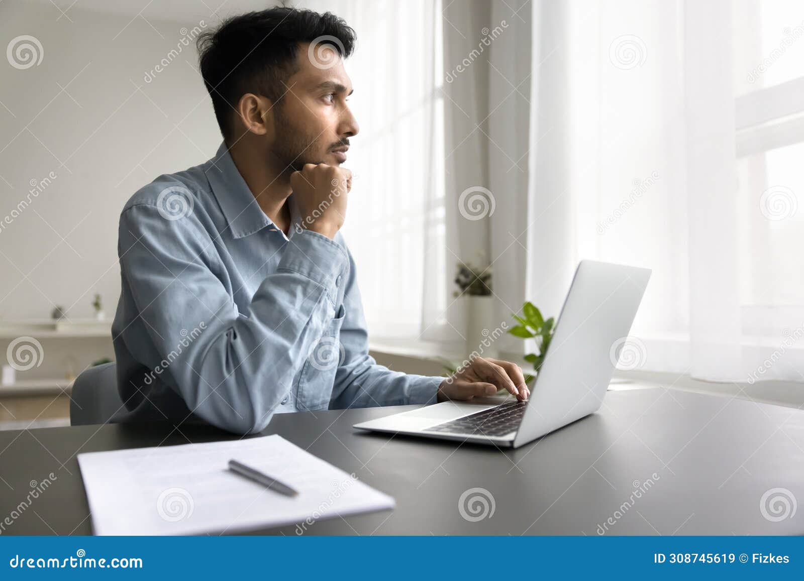 Distracted from Laptop Work Pensive Indian Man Looking in Distance ...