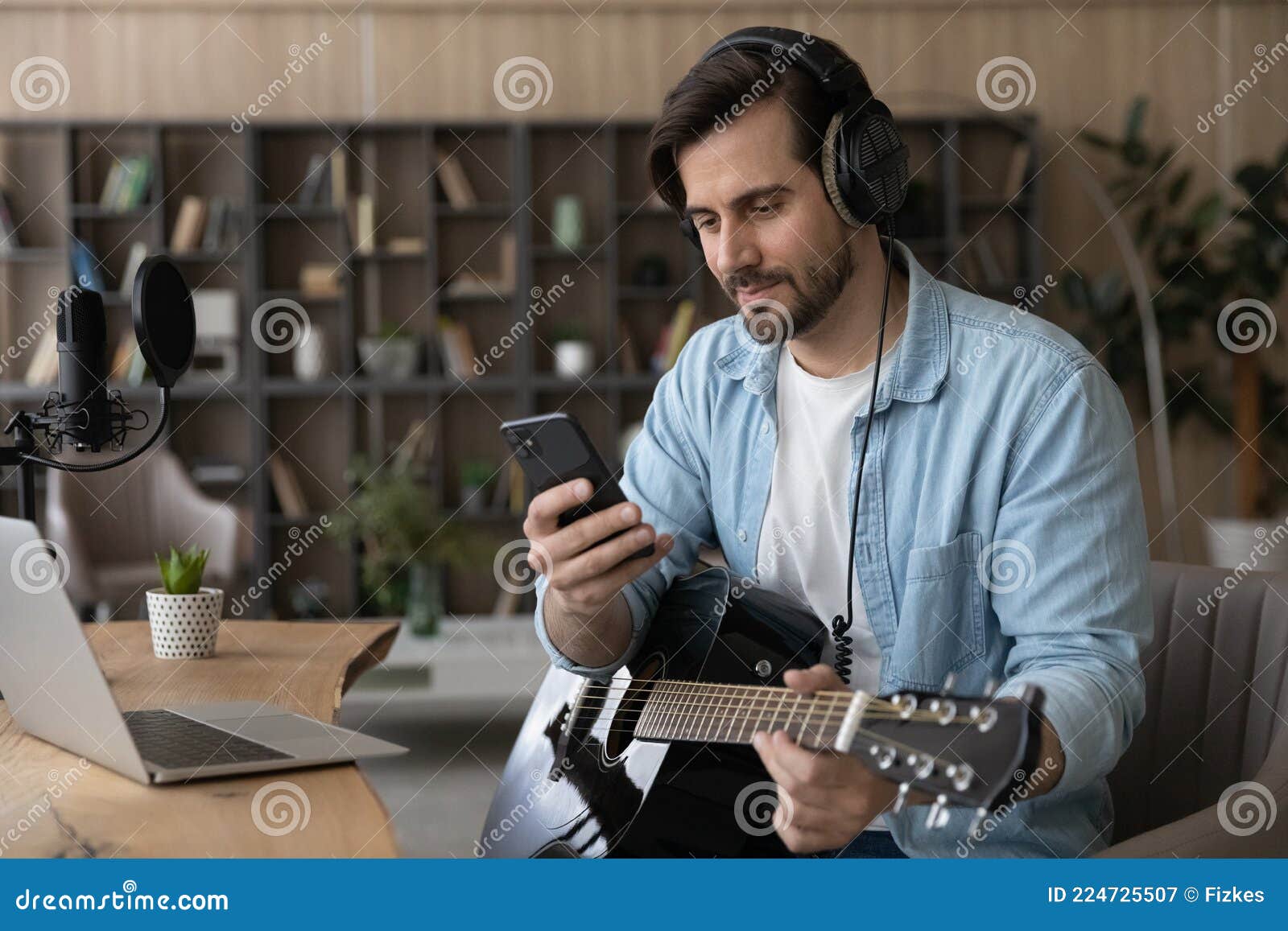 Distracted from Practicing Music Happy Young Musician Using Smartphone ...