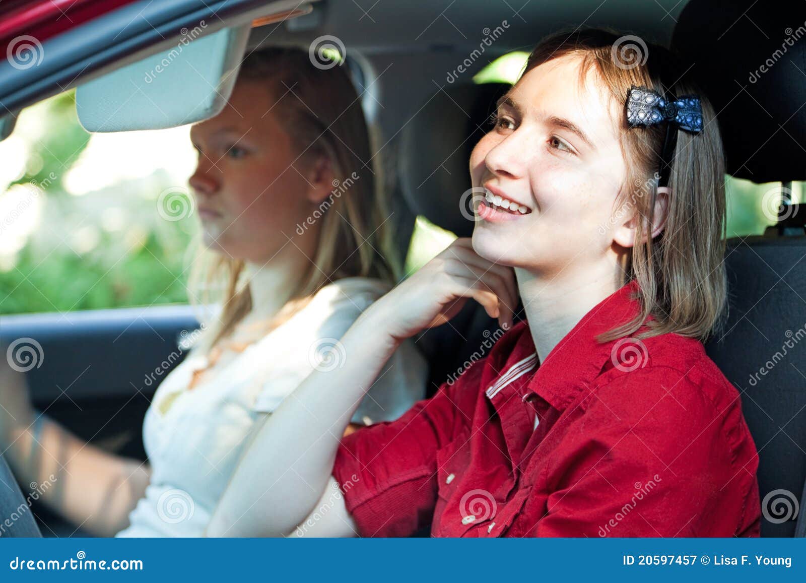 Distracted Teenage Driver stock image. Image of illegal - 20597457