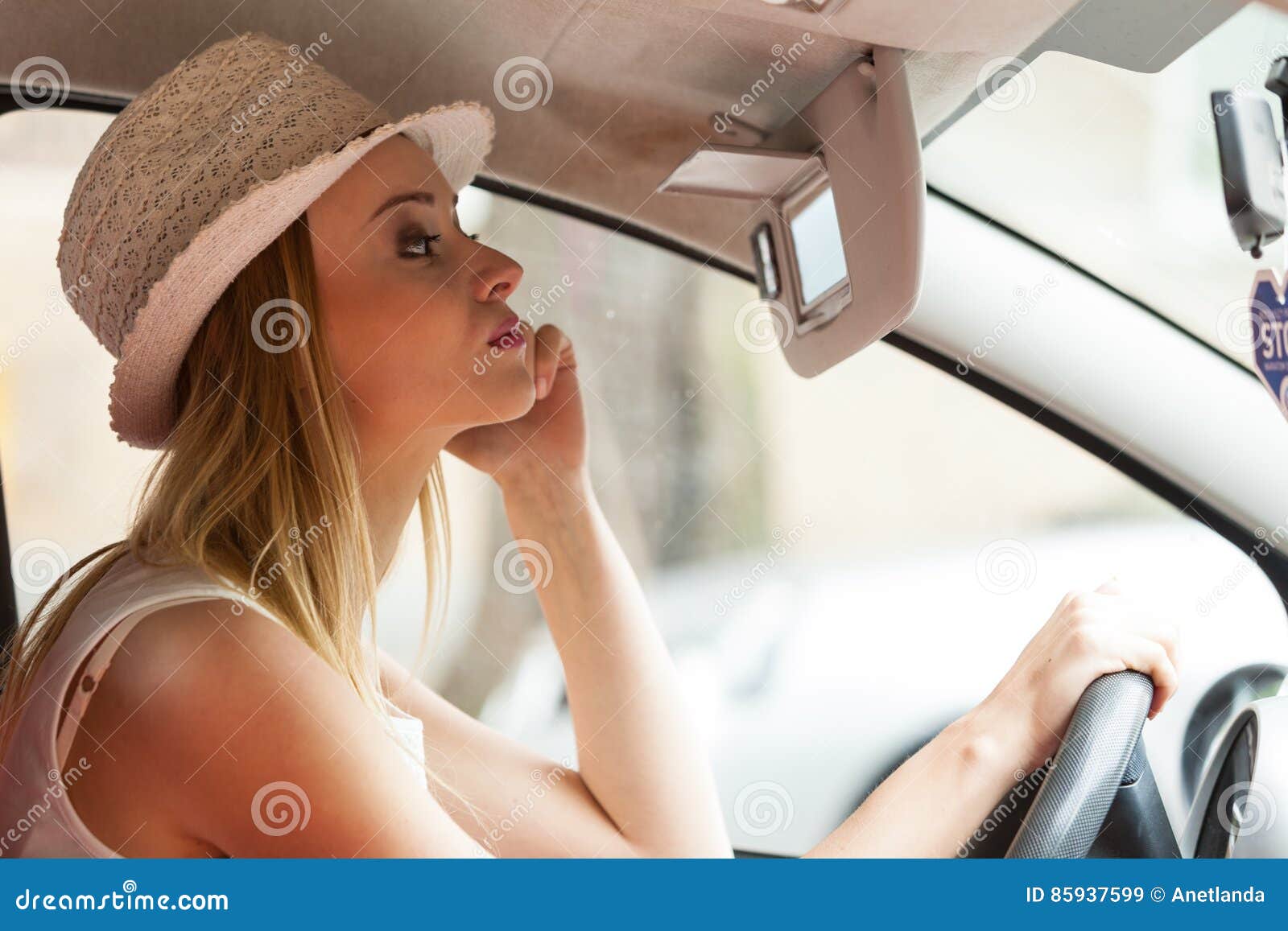 Distracted Woman Driving Her Car Looking In Mirror Stock Image Image