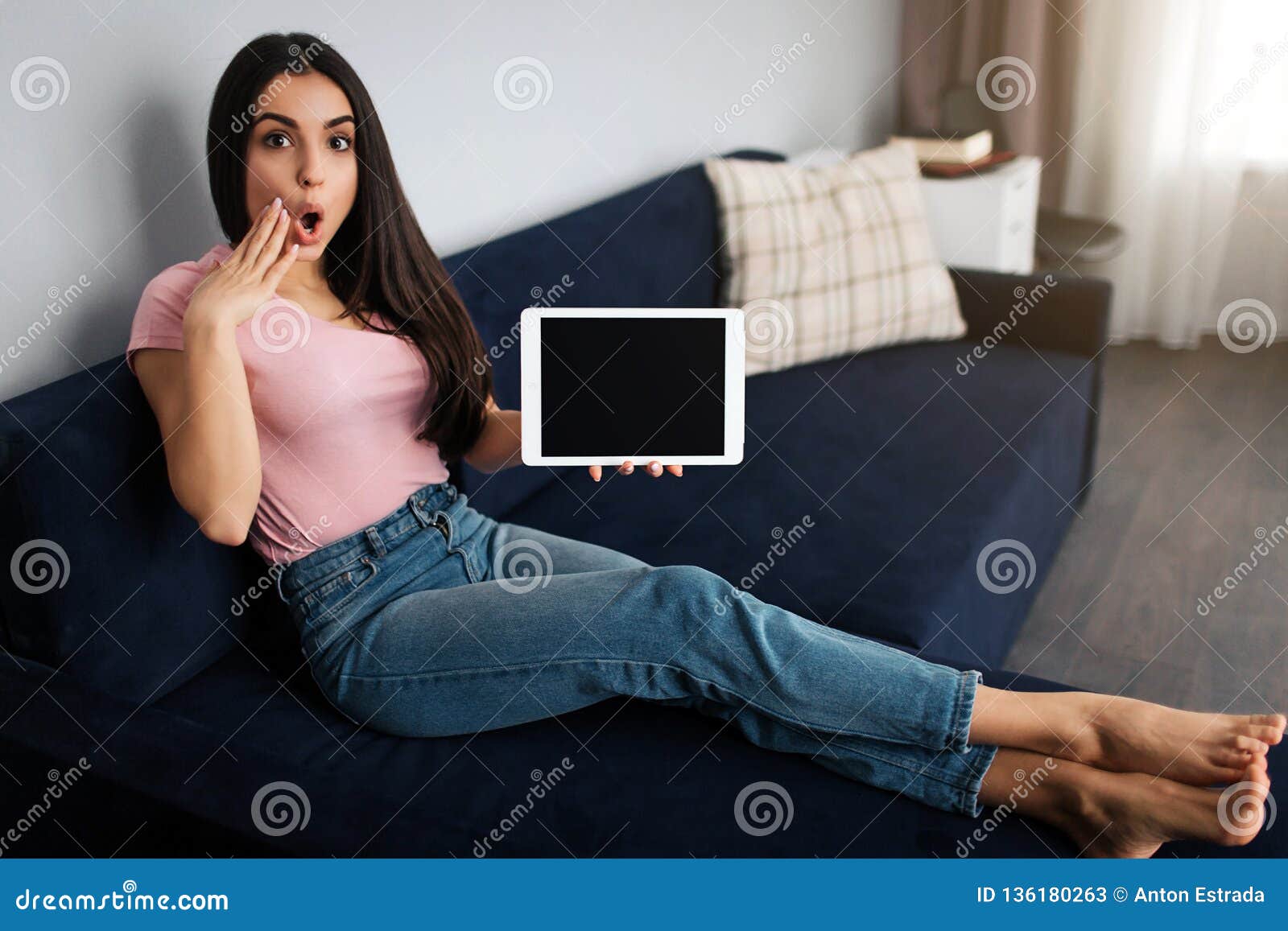 Distracted Young Well Built Woman Eating Cheese And Look At Plus Size
