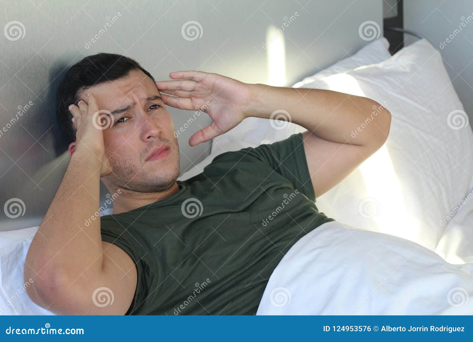 Distraught Young Male in Bed Stock Photo - Image of disorder ...
