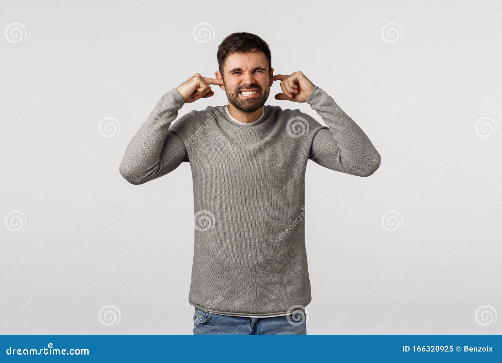 Distressed and Disturbed Guy Bothered by Loud Neighbour, Grimacing ...