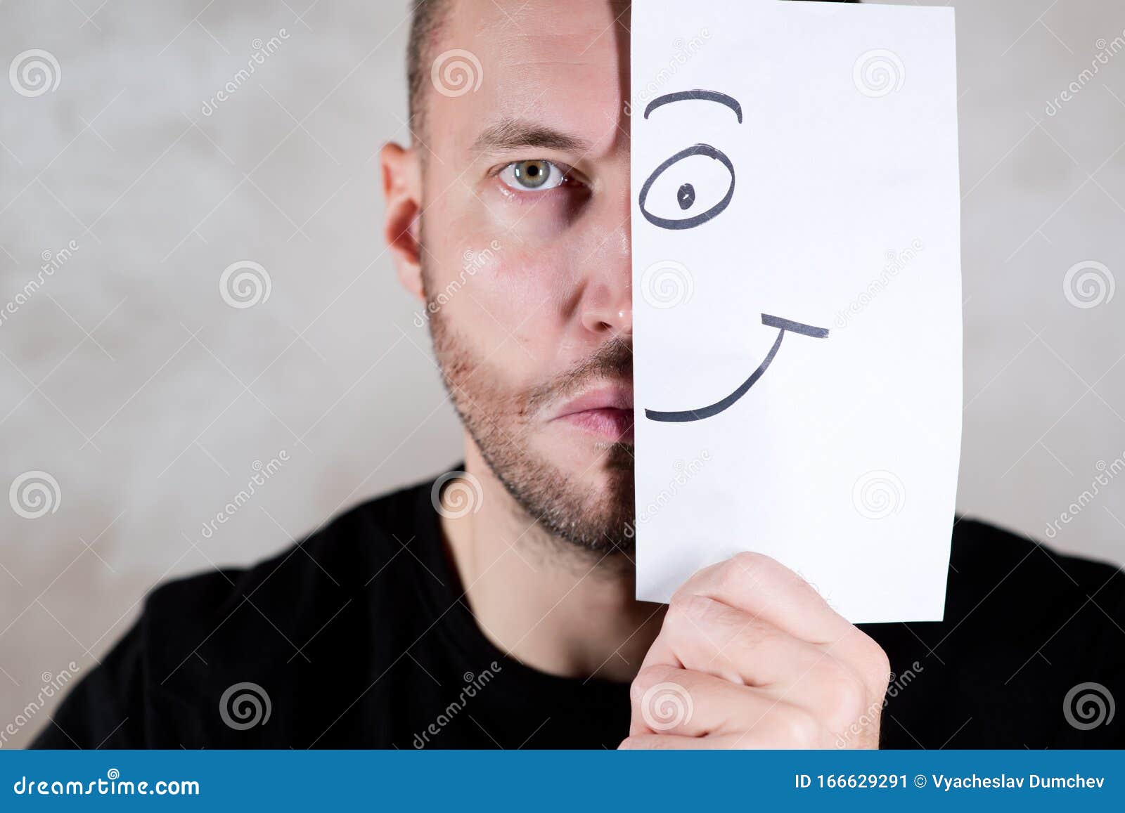 Distressed Man Covers Half His Face with a Sheet with a Painted Smile ...