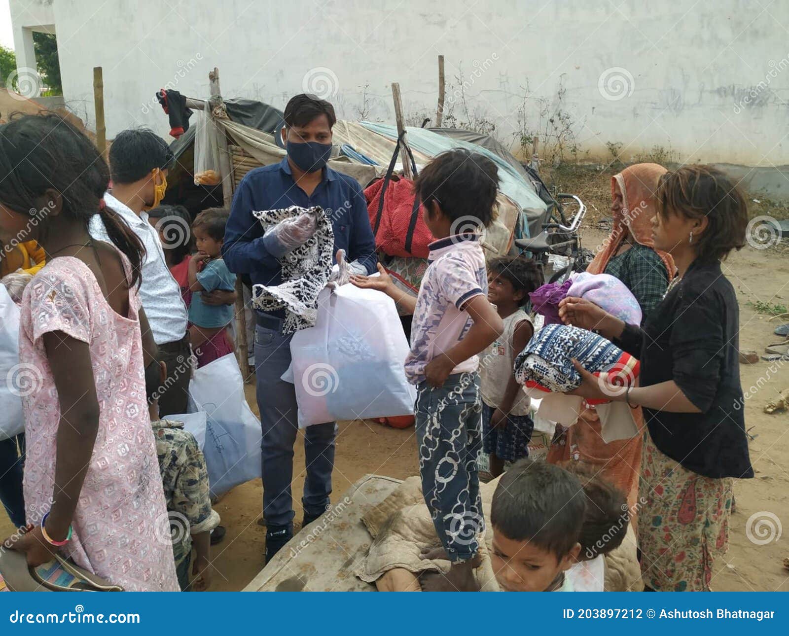 DISTRIBUTION of MATERIAL editorial photography. Image of crowd - 203897212