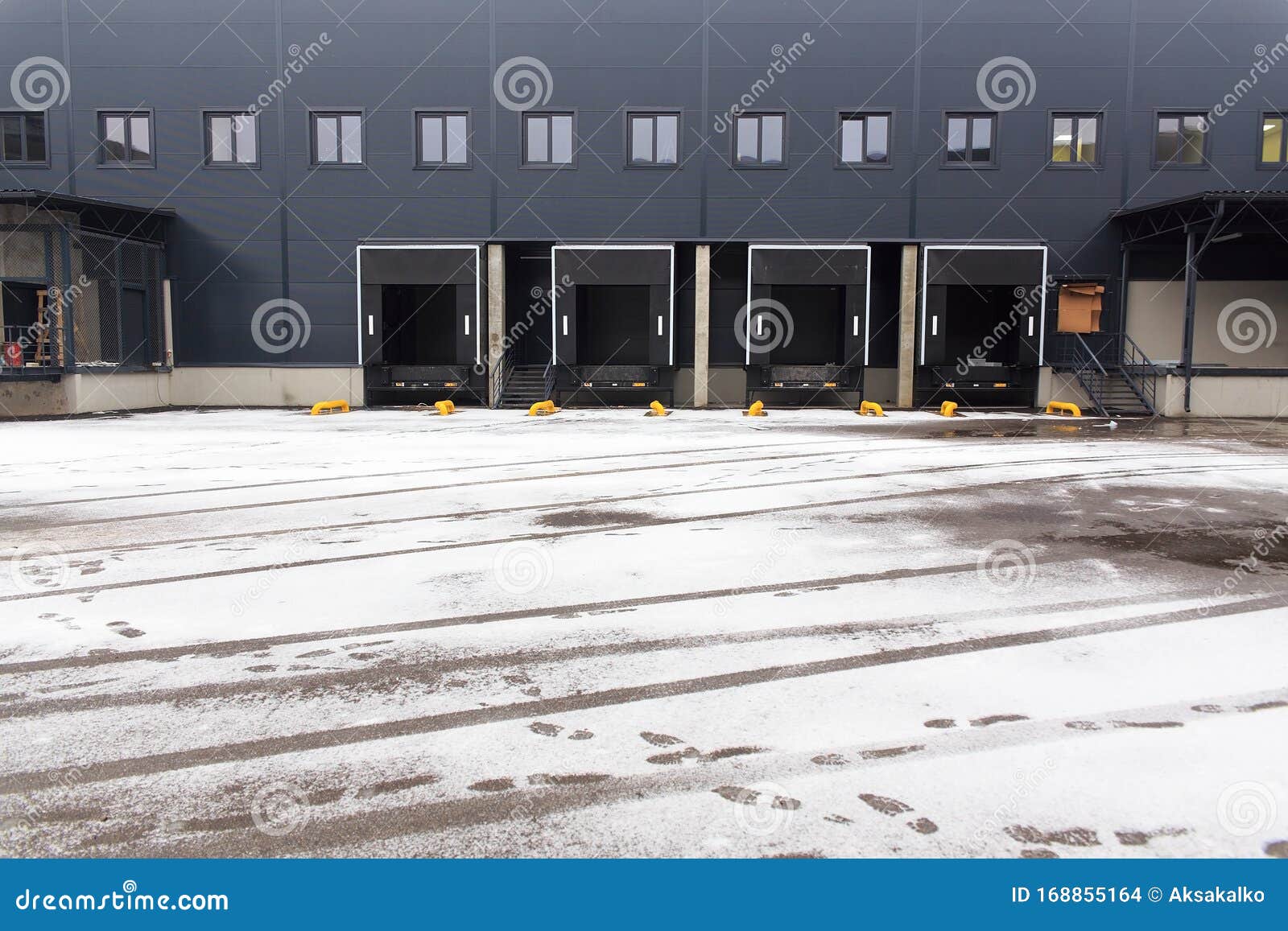A Distribution Warehouse with Cargo Doors Stock Photo - Image of city ...