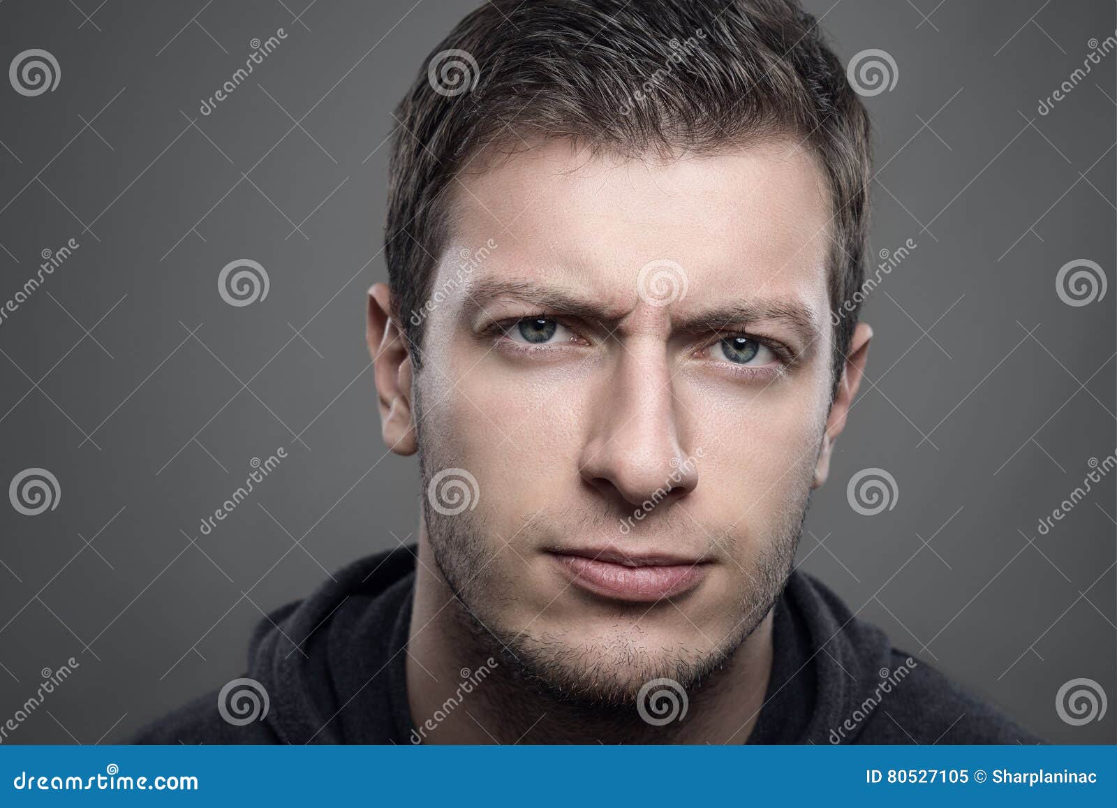 Distrustful Young Man Looking at Camera Stock Image - Image of ...