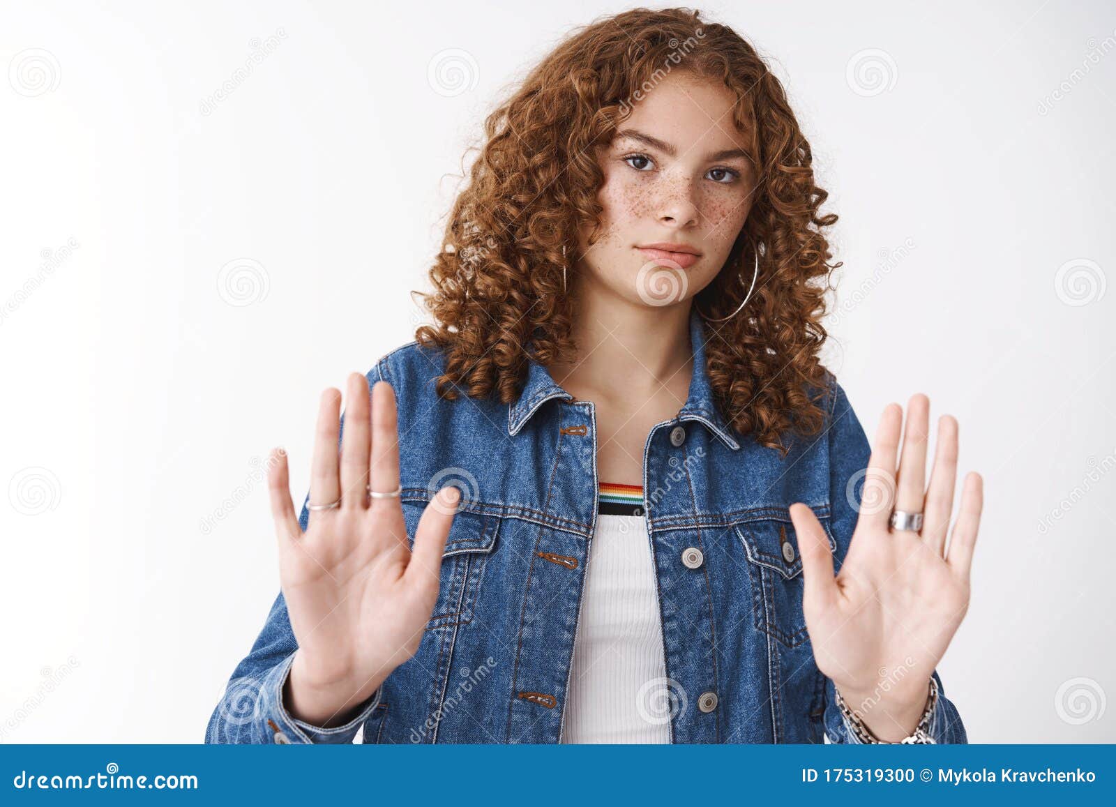 Reluctant Girl Frowns And Complains Points Up At Bad Upsetting Thing Looking Disappointed And