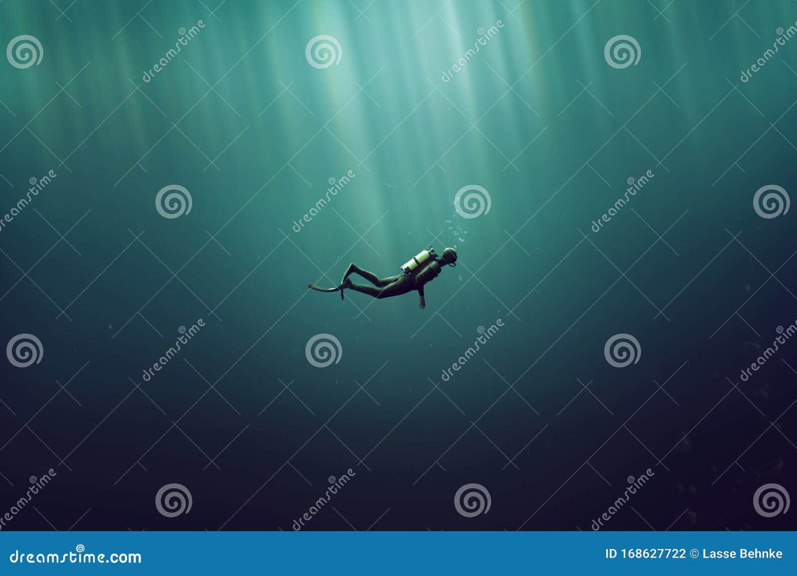 Diver in the deep sea stock photo. Image of snorkeling - 168627722