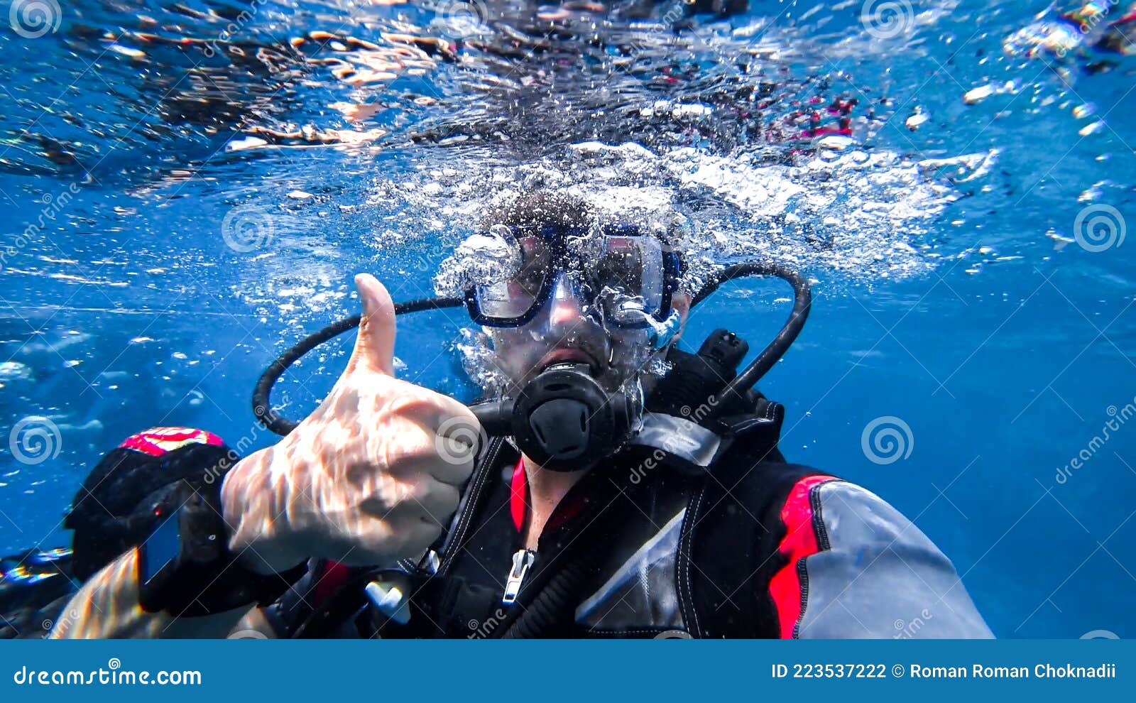 Diver Looks at the Camera and Gives a Thumbs Up Stock Photo - Image of ...